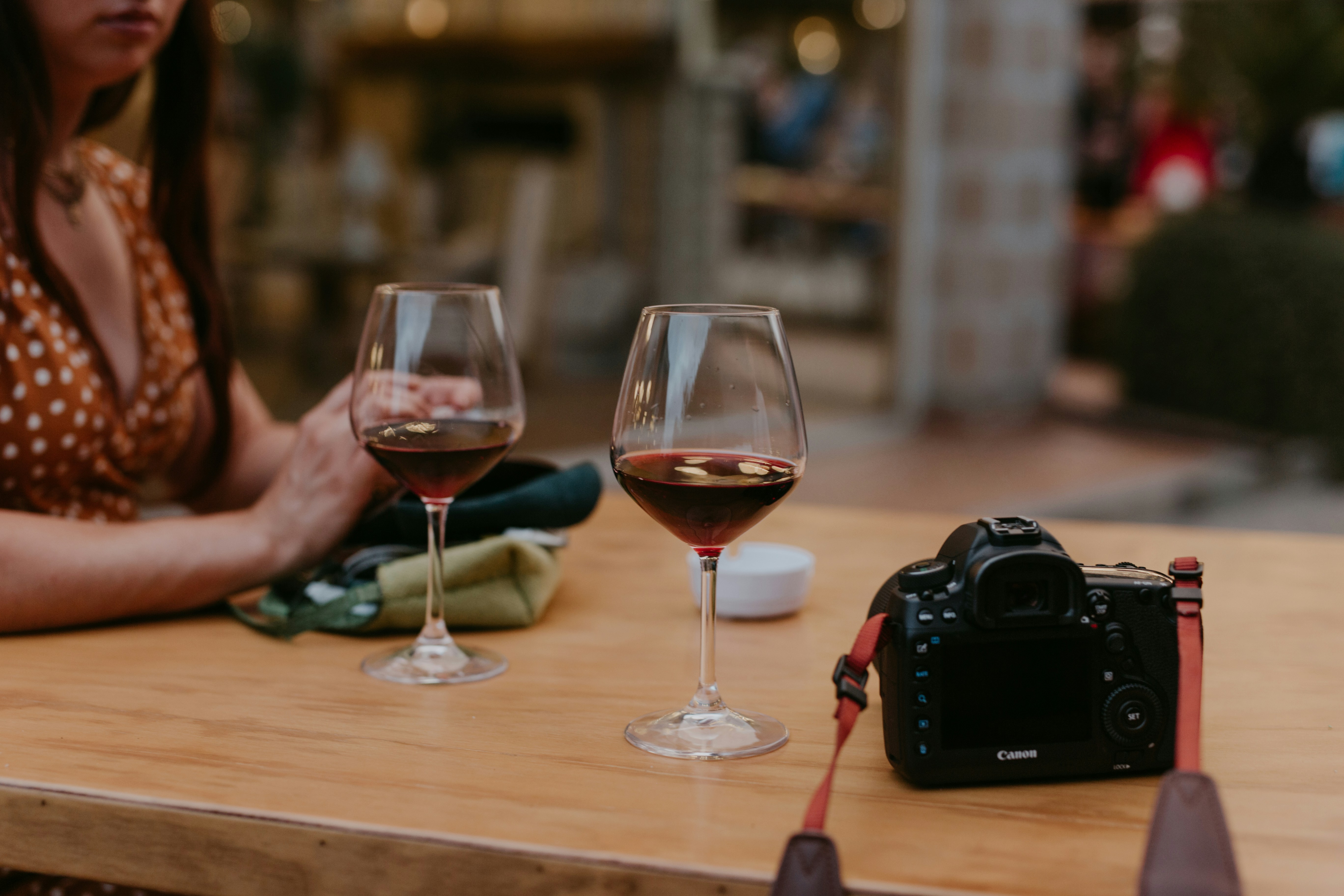 A couple of wine glasses with red wine in them photo – Free Wine Image ...