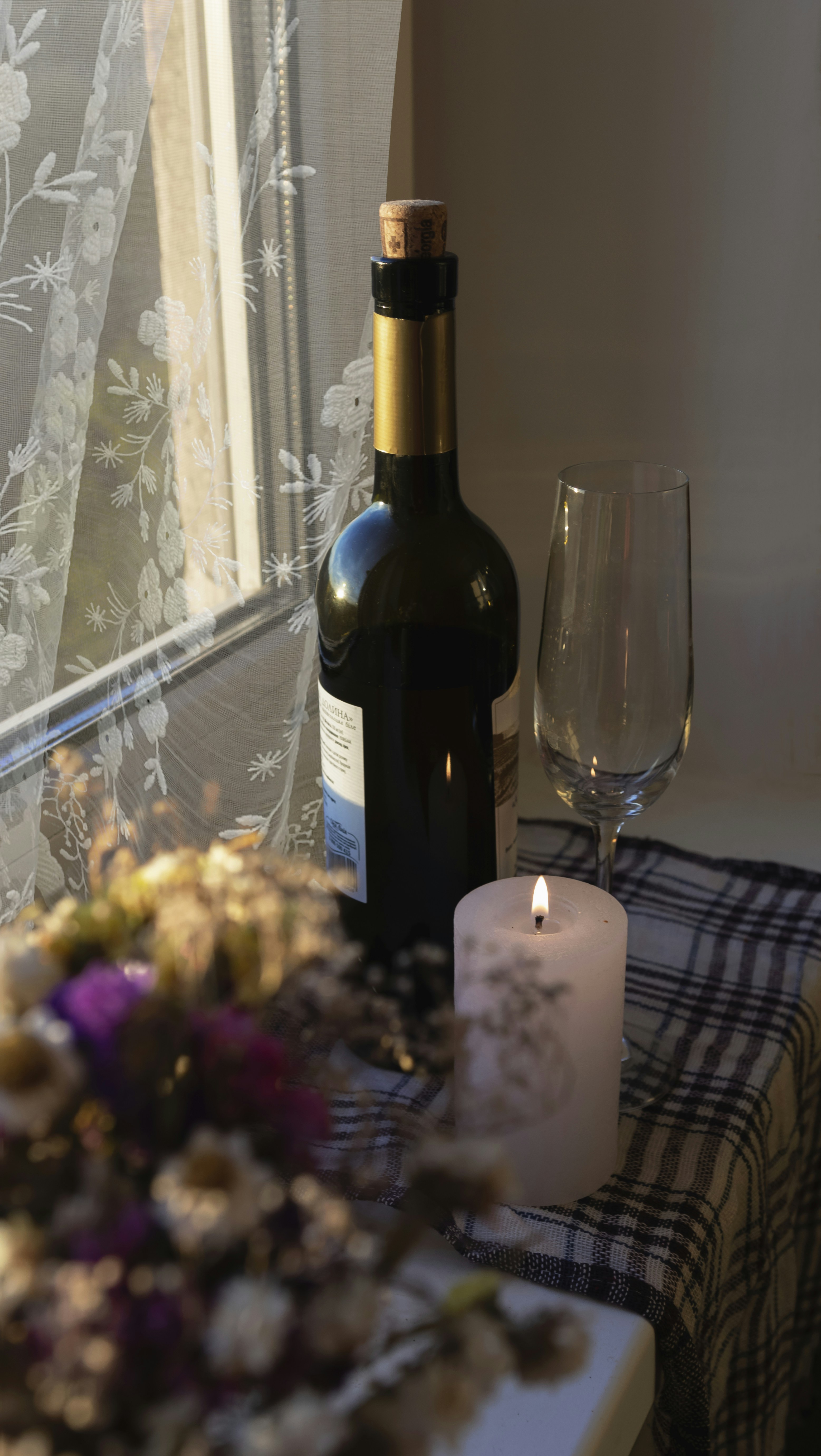 Candlelit Quietude: Wine Bottle & Lace by Window