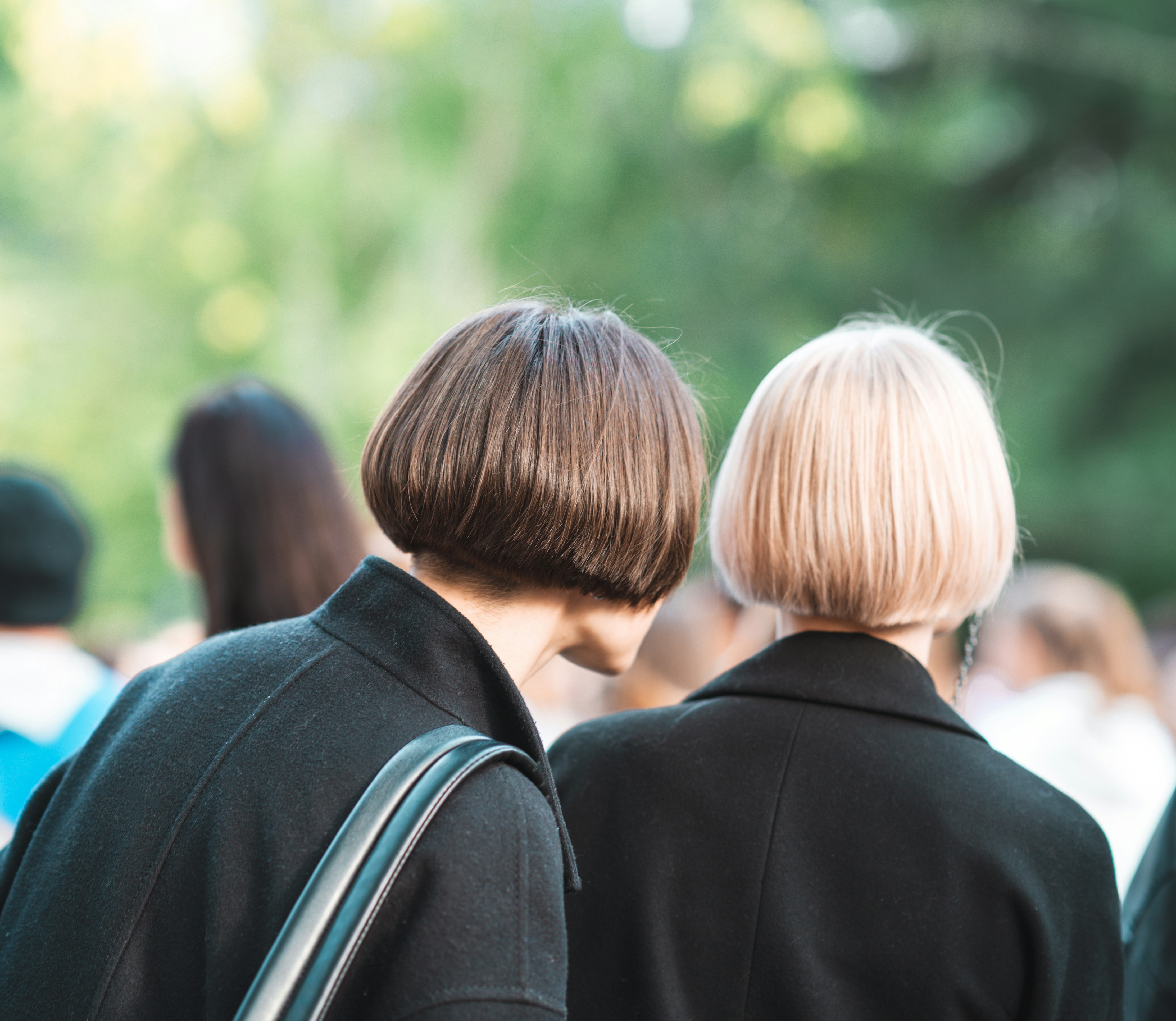 A group of people facing each other photo – Free Hair Image on Unsplash