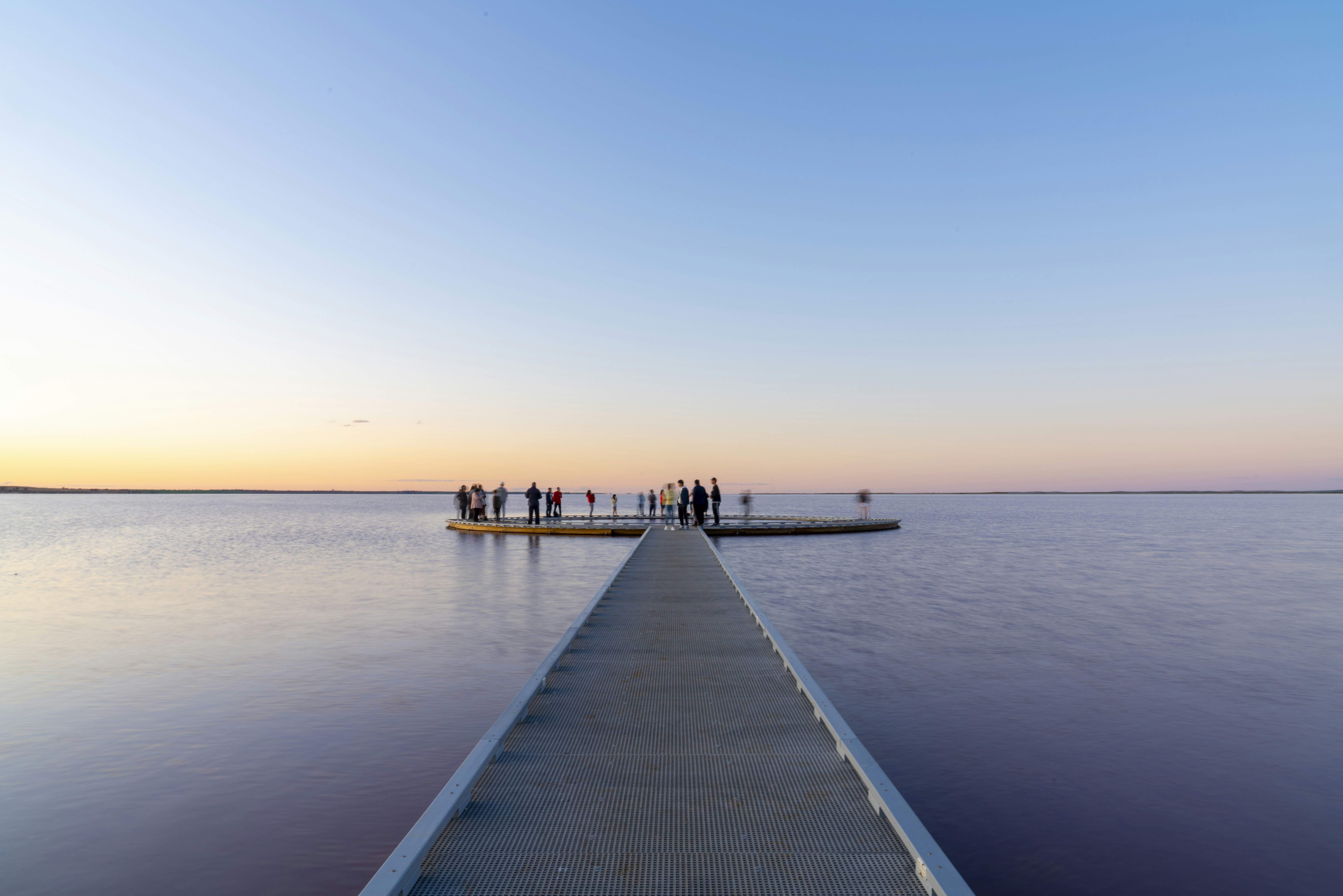 A group of people on a dock photo – Free Lake tyrrell Image on Unsplash