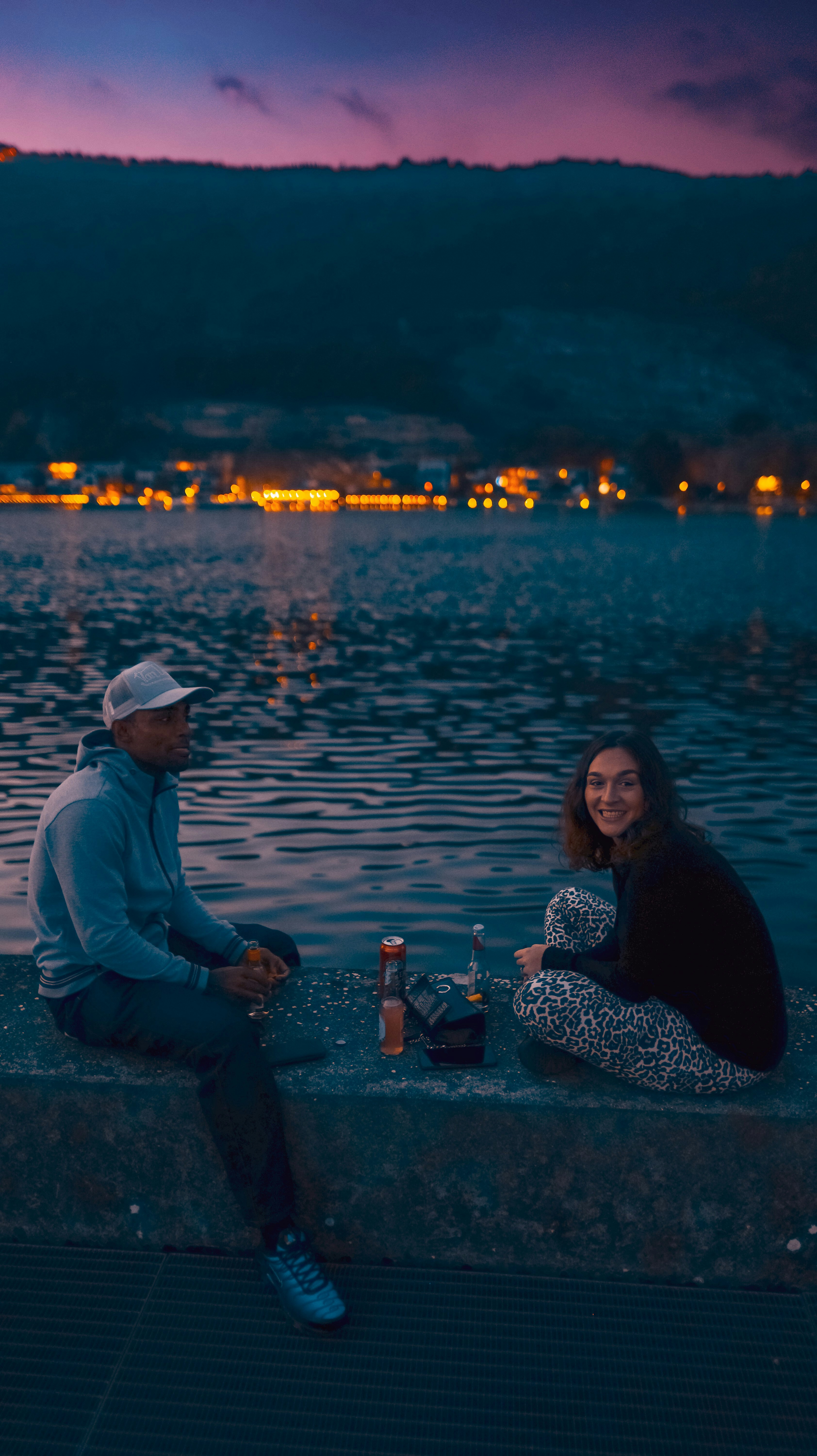Evening Riverside Chat: A Quiet Moment by the Water