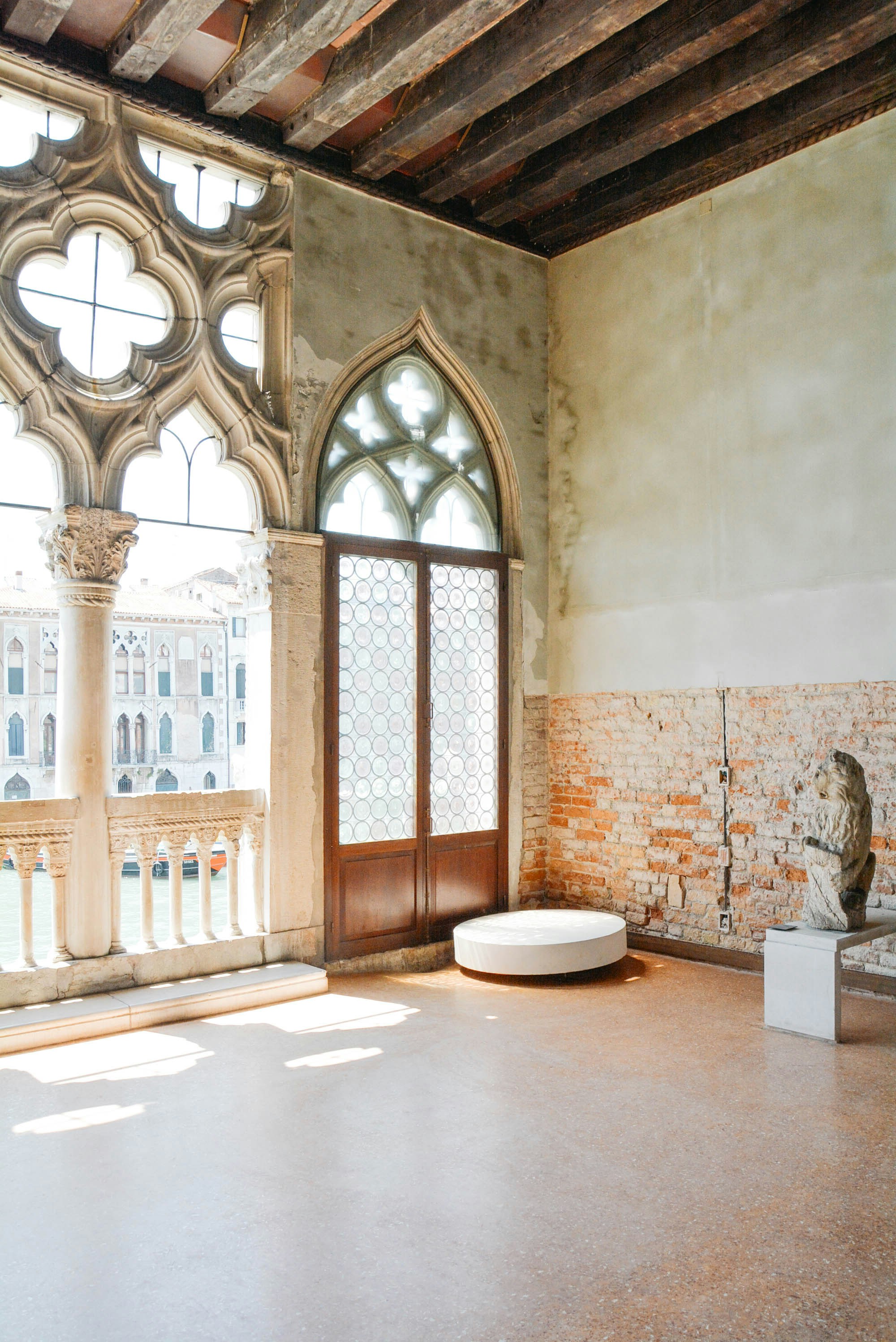 Gothic Light: Sunlit Arches in a Quiet Historic Room