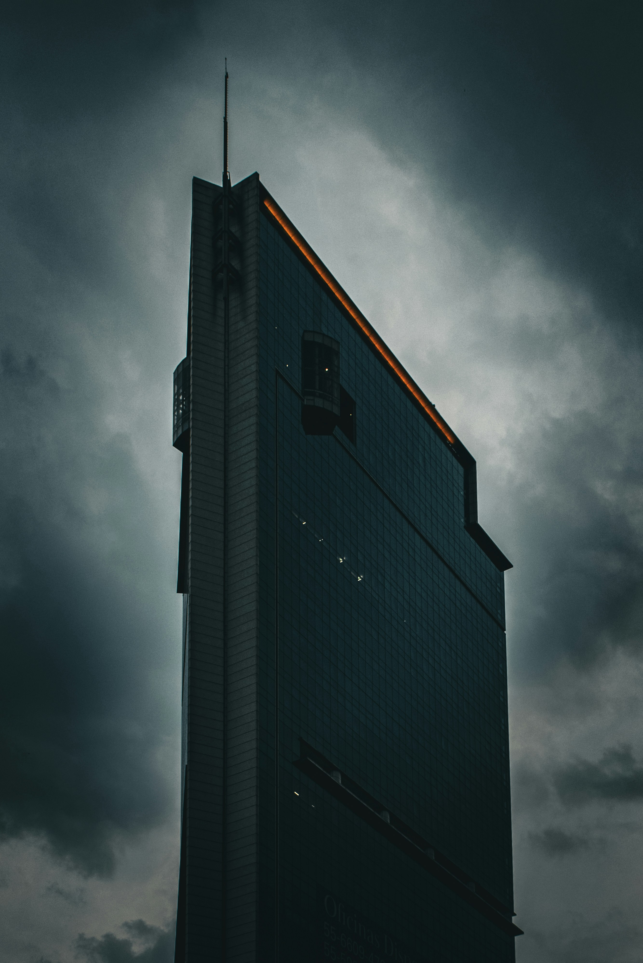 Orange-Rimmed Monolith Braving Stormy Skies