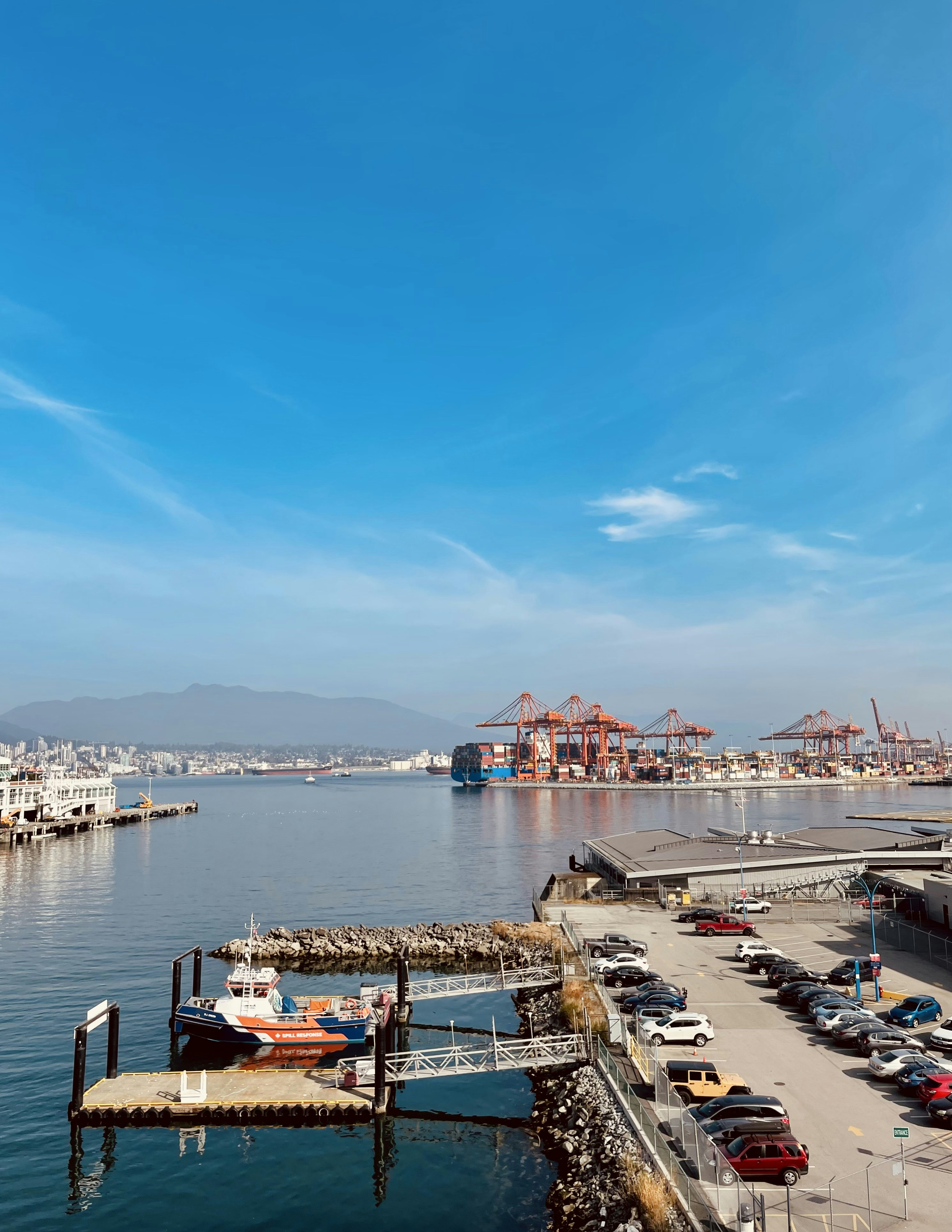 A dock with boats and cars photo – Free Vancouver Image on Unsplash