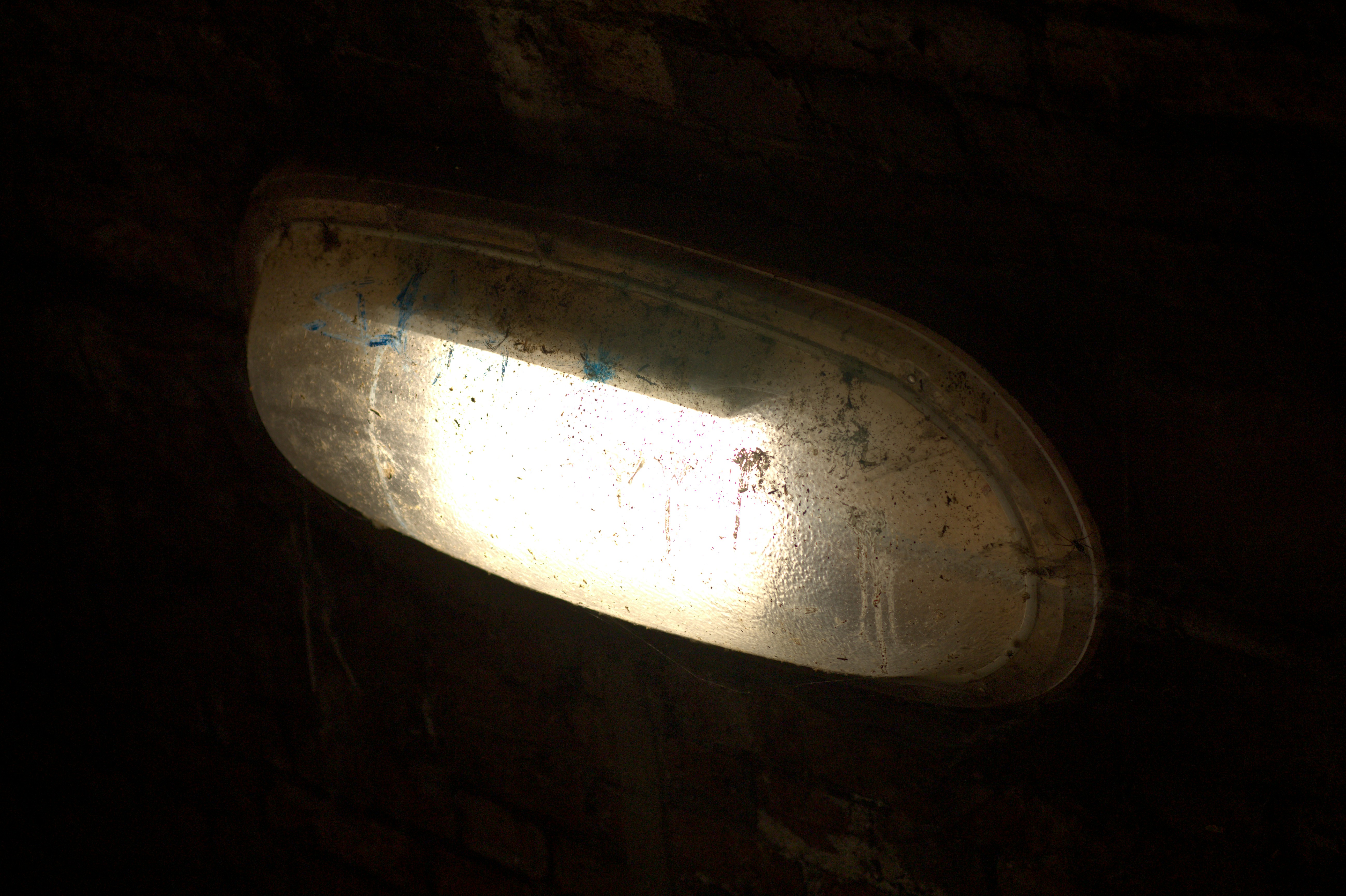 Dim Oval Light in a Dark Tunnel