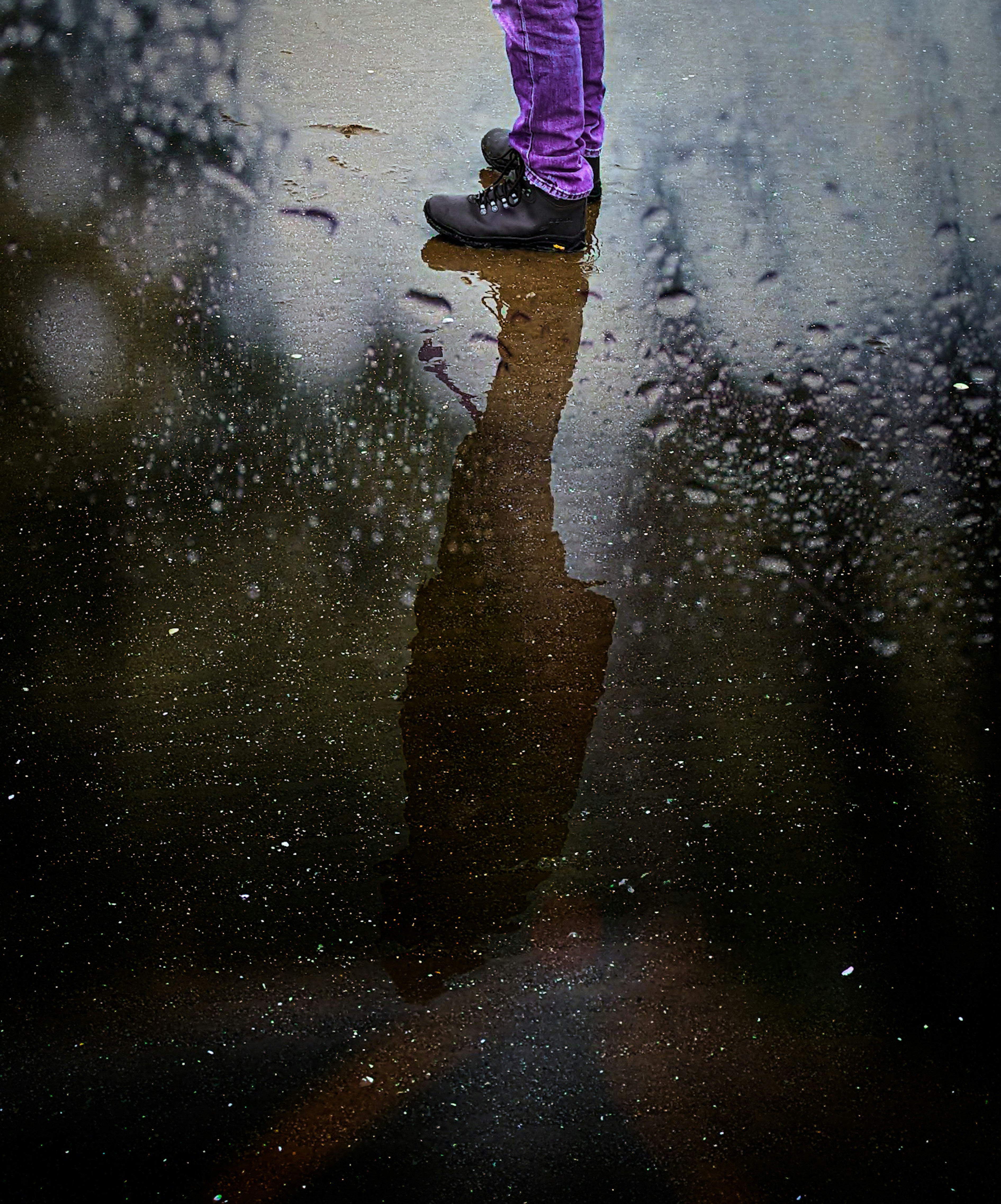 A person standing in a puddle photo – Free Puddle Image on Unsplash