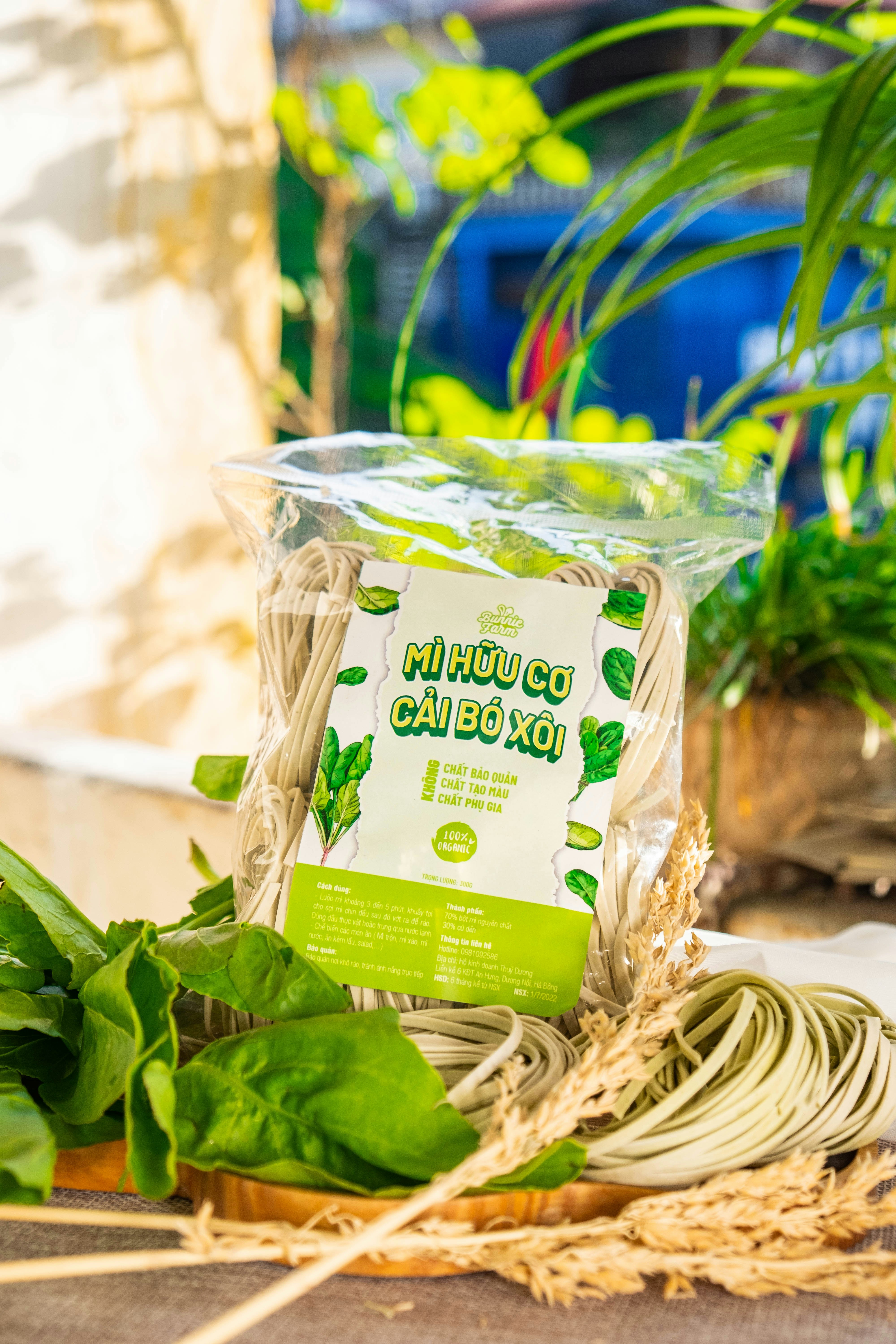 Green Noodle Packaging in Bright Market Light