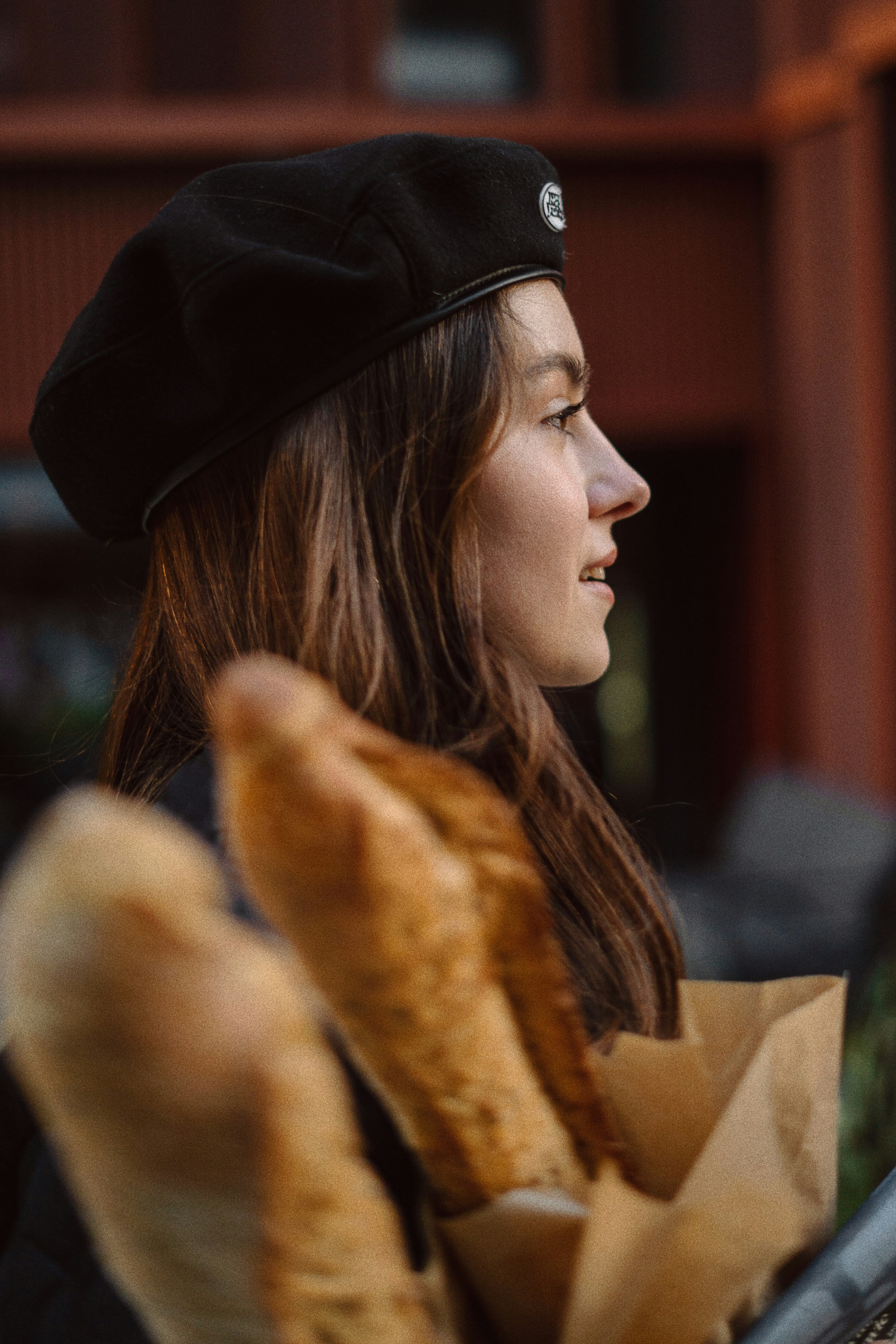 Profile in Focus: A Candid Bite of Fresh Bread and City Light