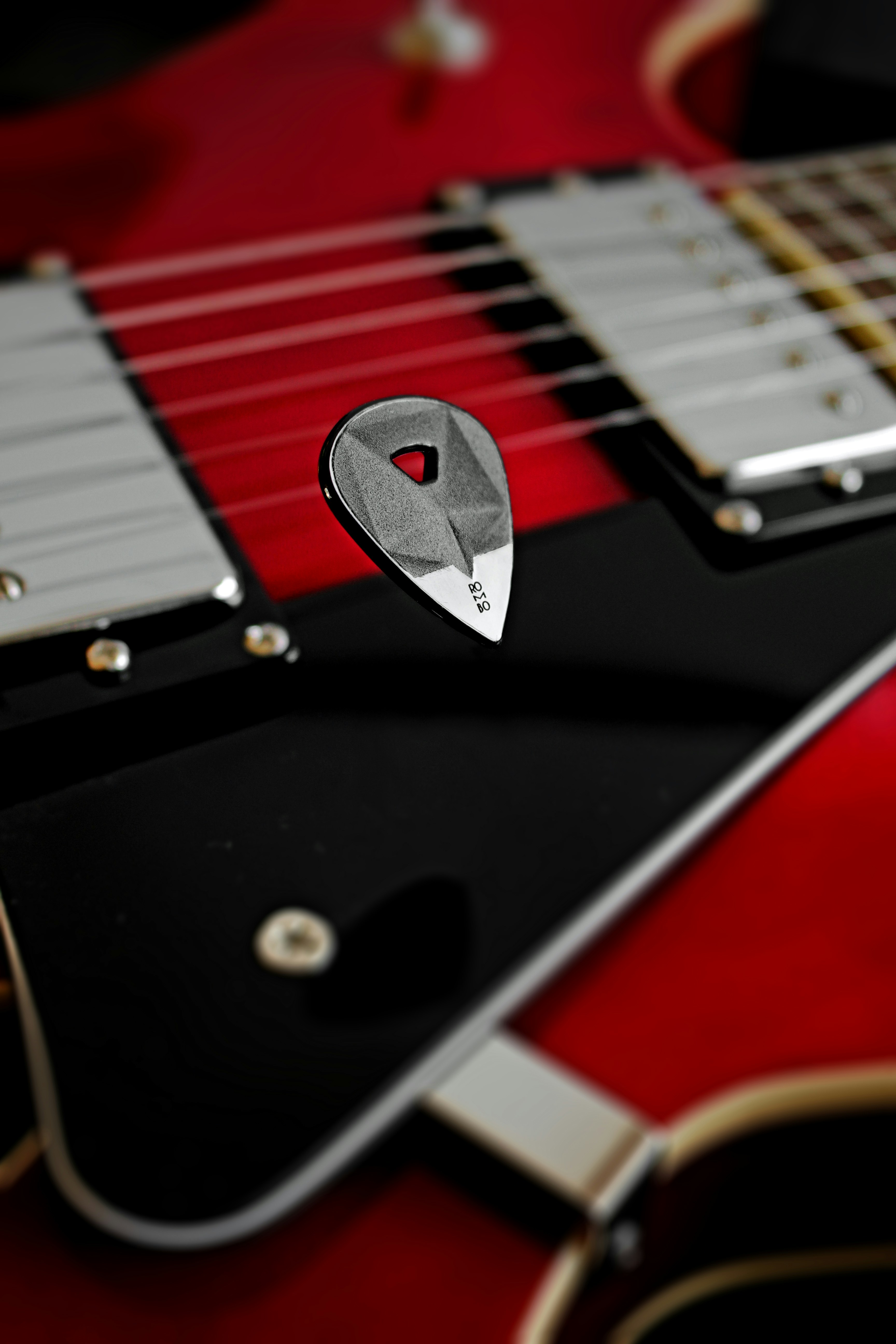 A close up of a guitar photo – Free Plectrum Image on Unsplash