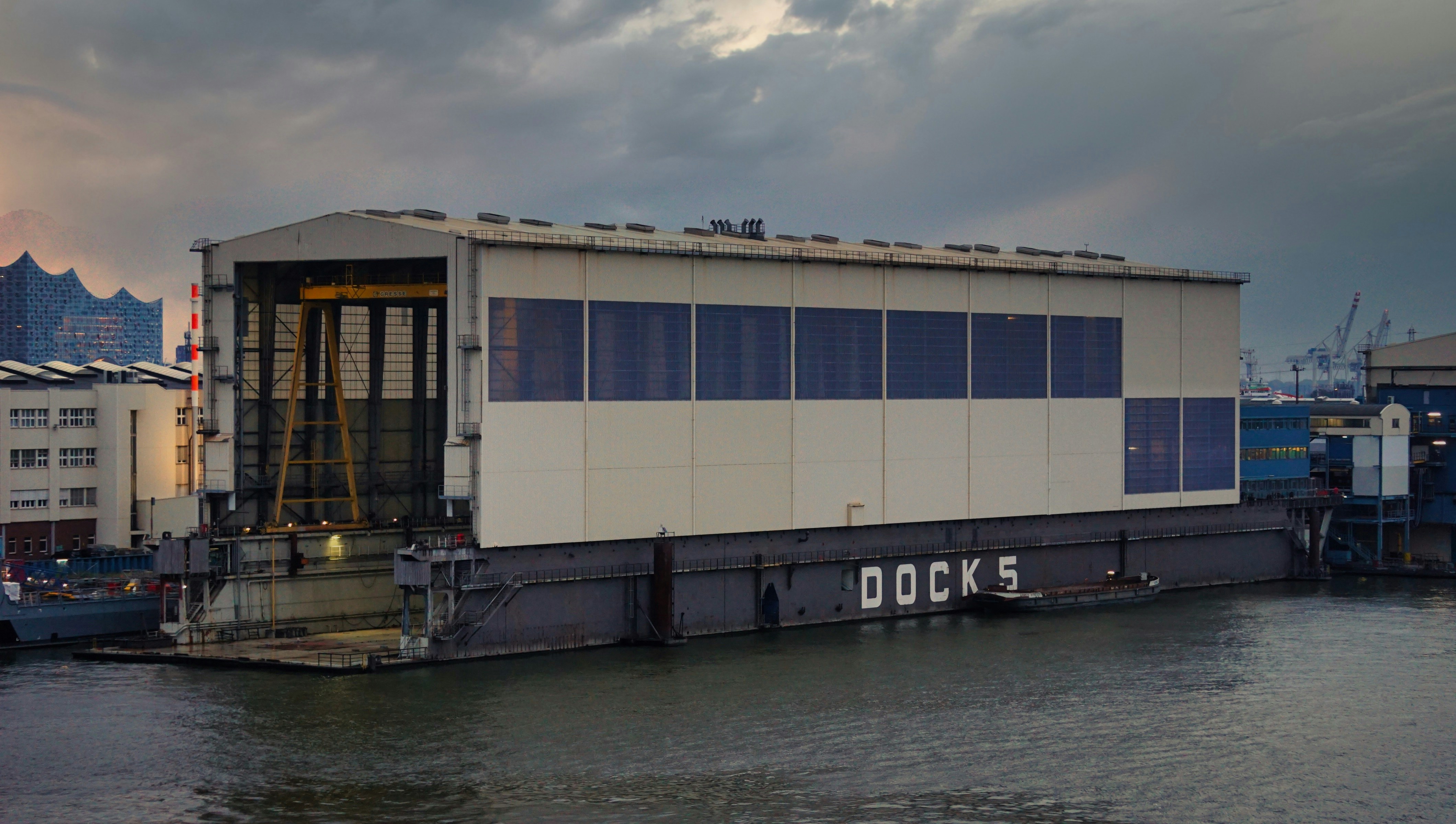 A building on a dock photo – Free Harbour Image on Unsplash