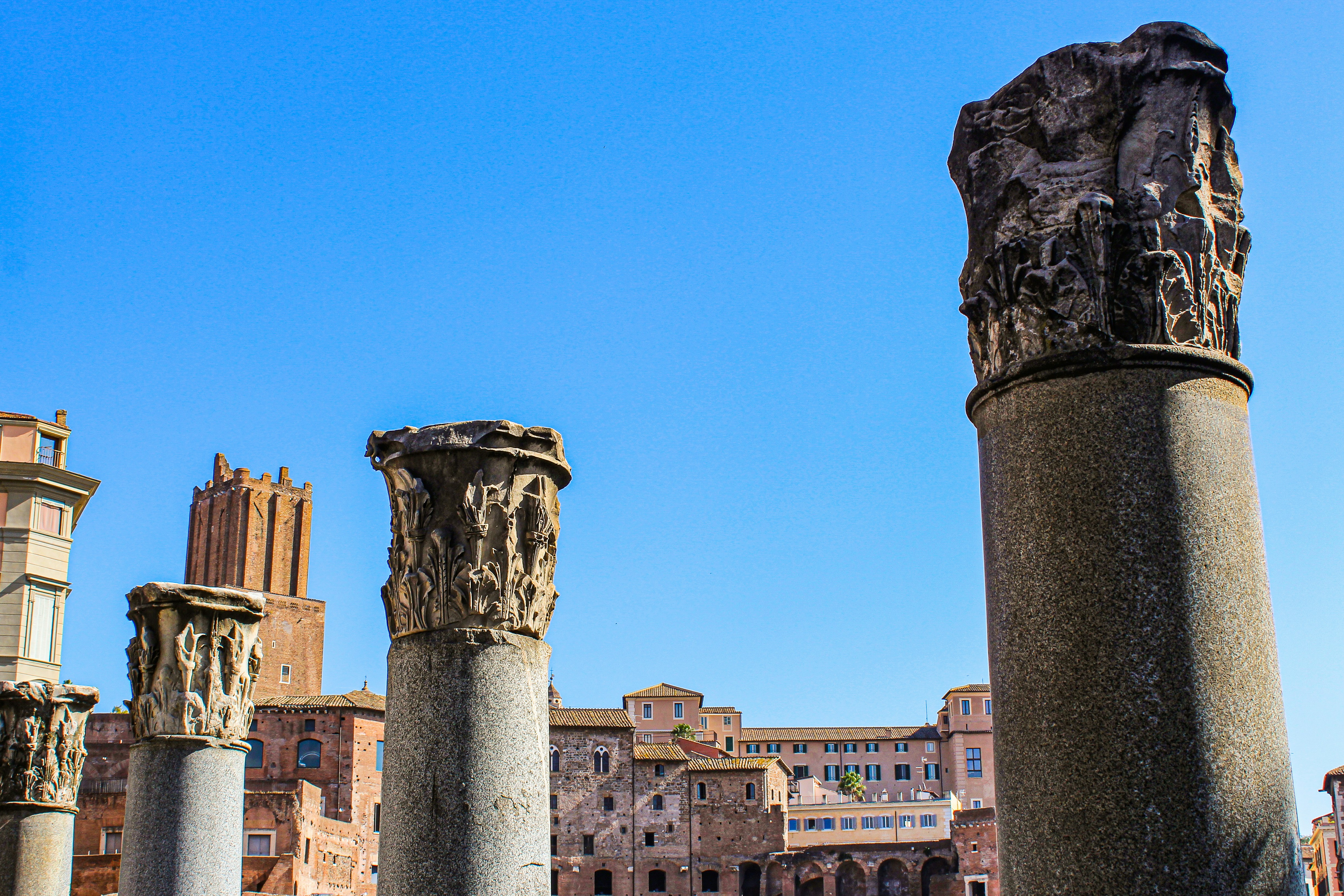 A group of stone statues photo – Free Building Image on Unsplash