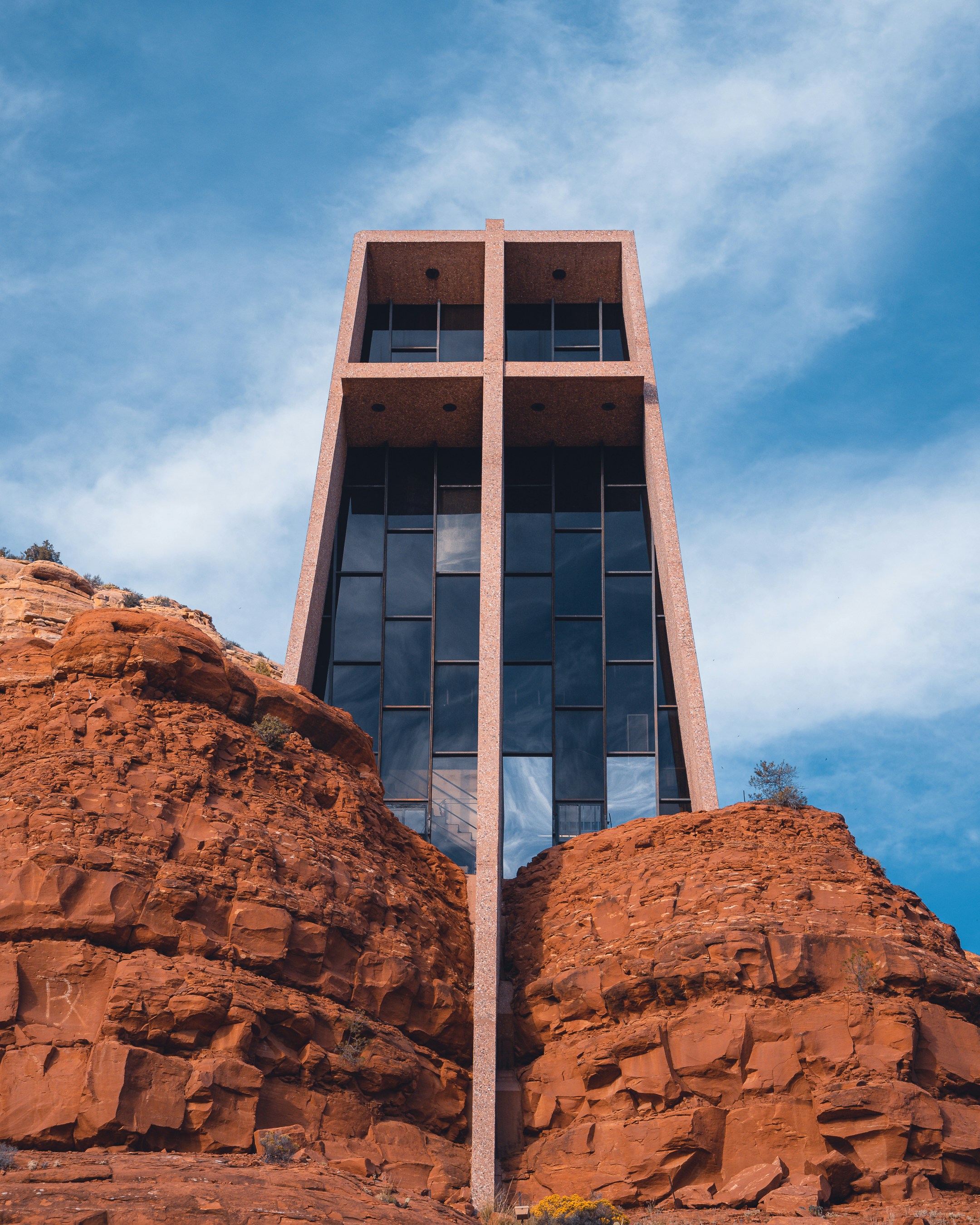 A building on a rocky cliff photo – Free Building Image on Unsplash
