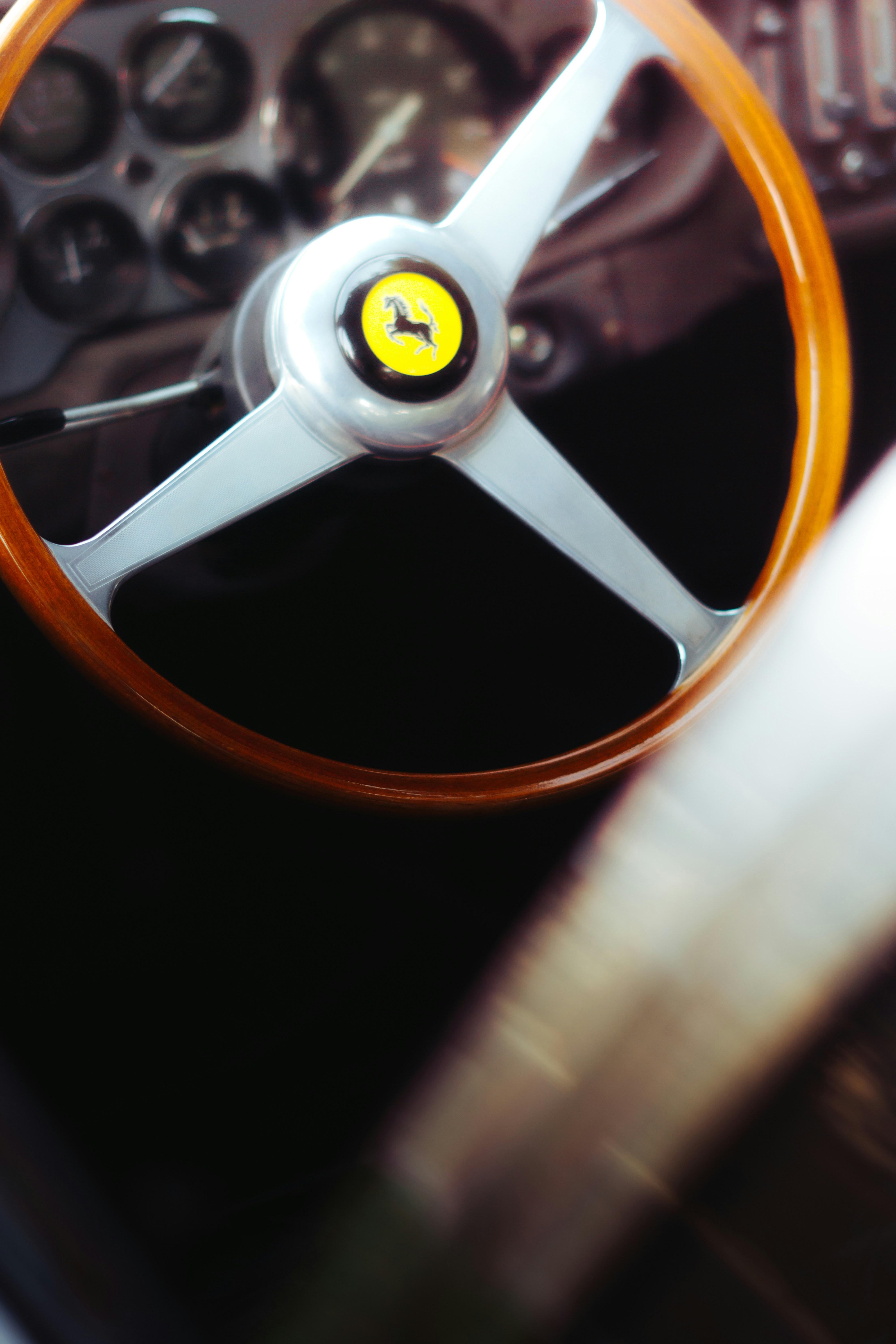 Crest of Craft: Close-Up on a Vintage Ferrari Steering Wheel