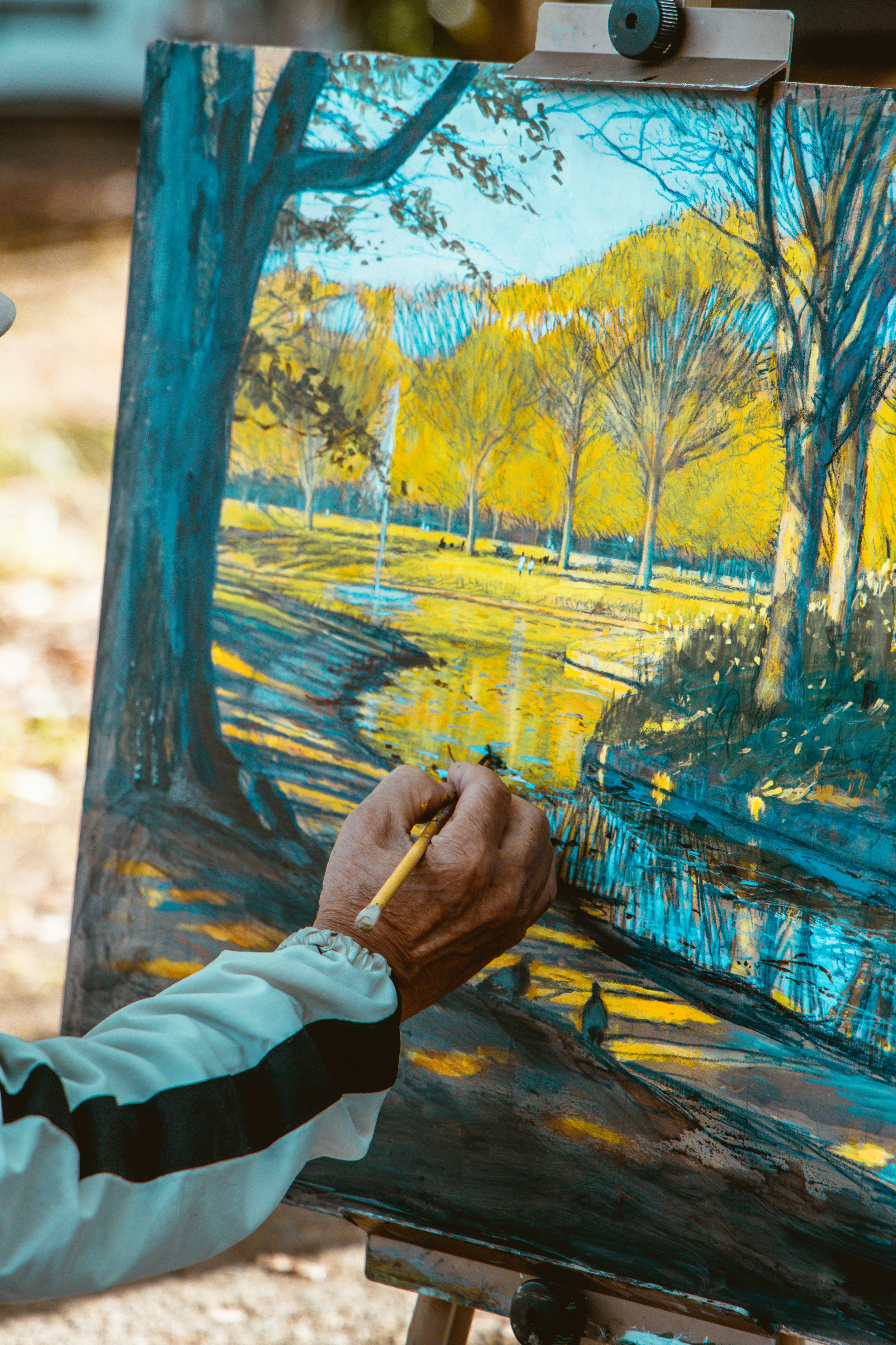 Brushstroke at Dappled Light: A Plein-Air Moment on the Easel