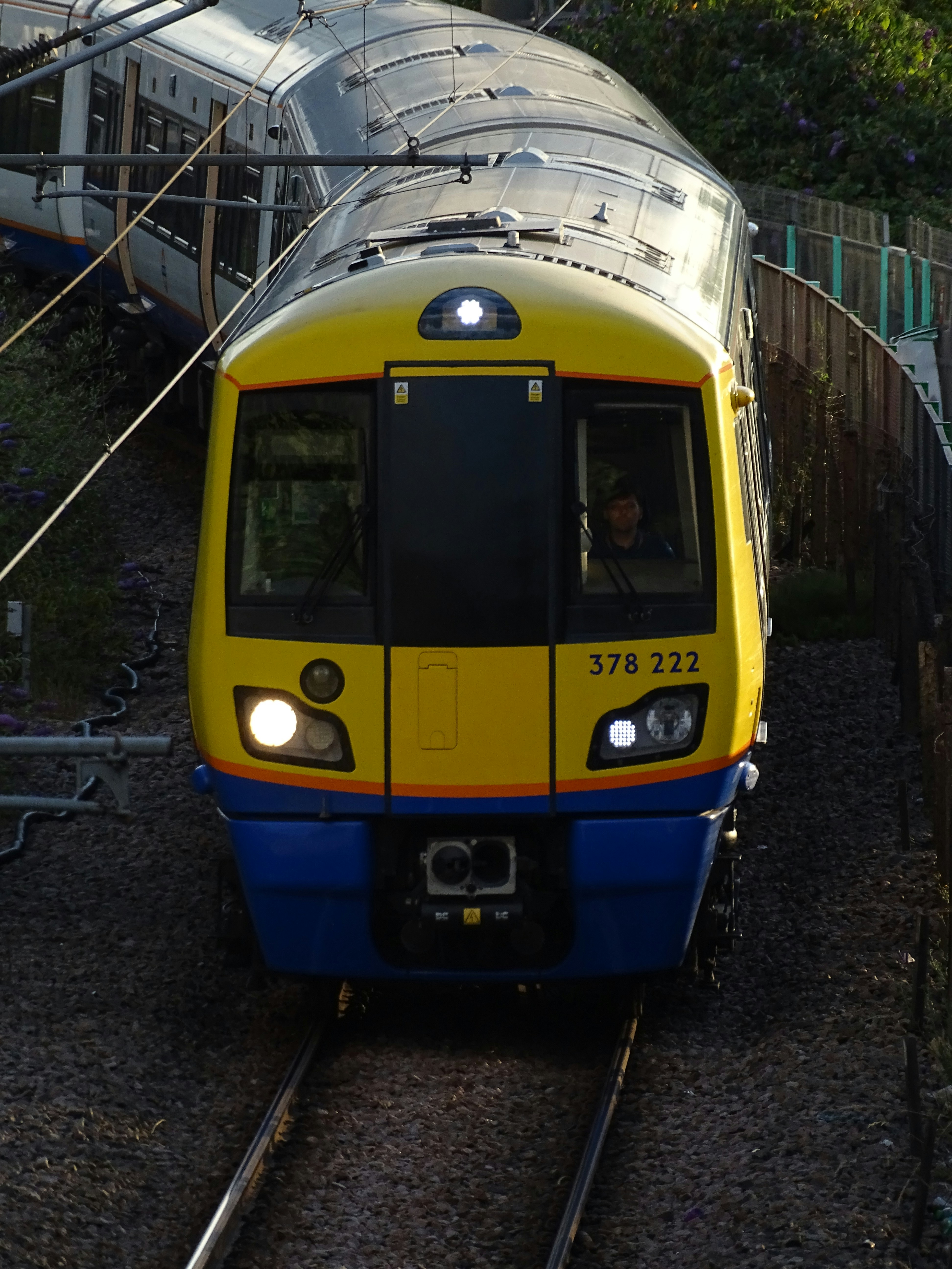 A yellow train on the tracks photo – Free Willesden junction ...
