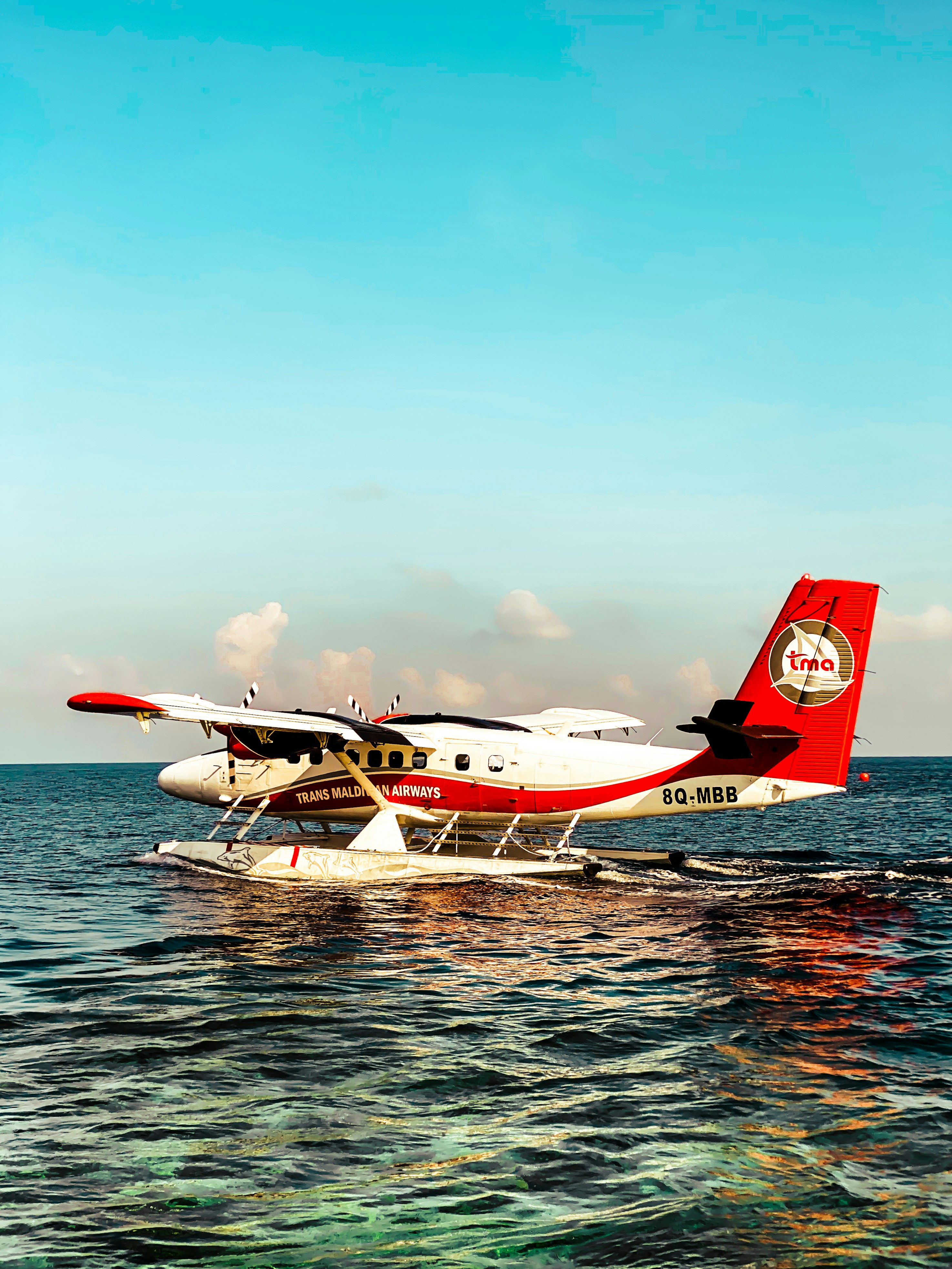A small airplane on the water photo – Free The westin maldives ...