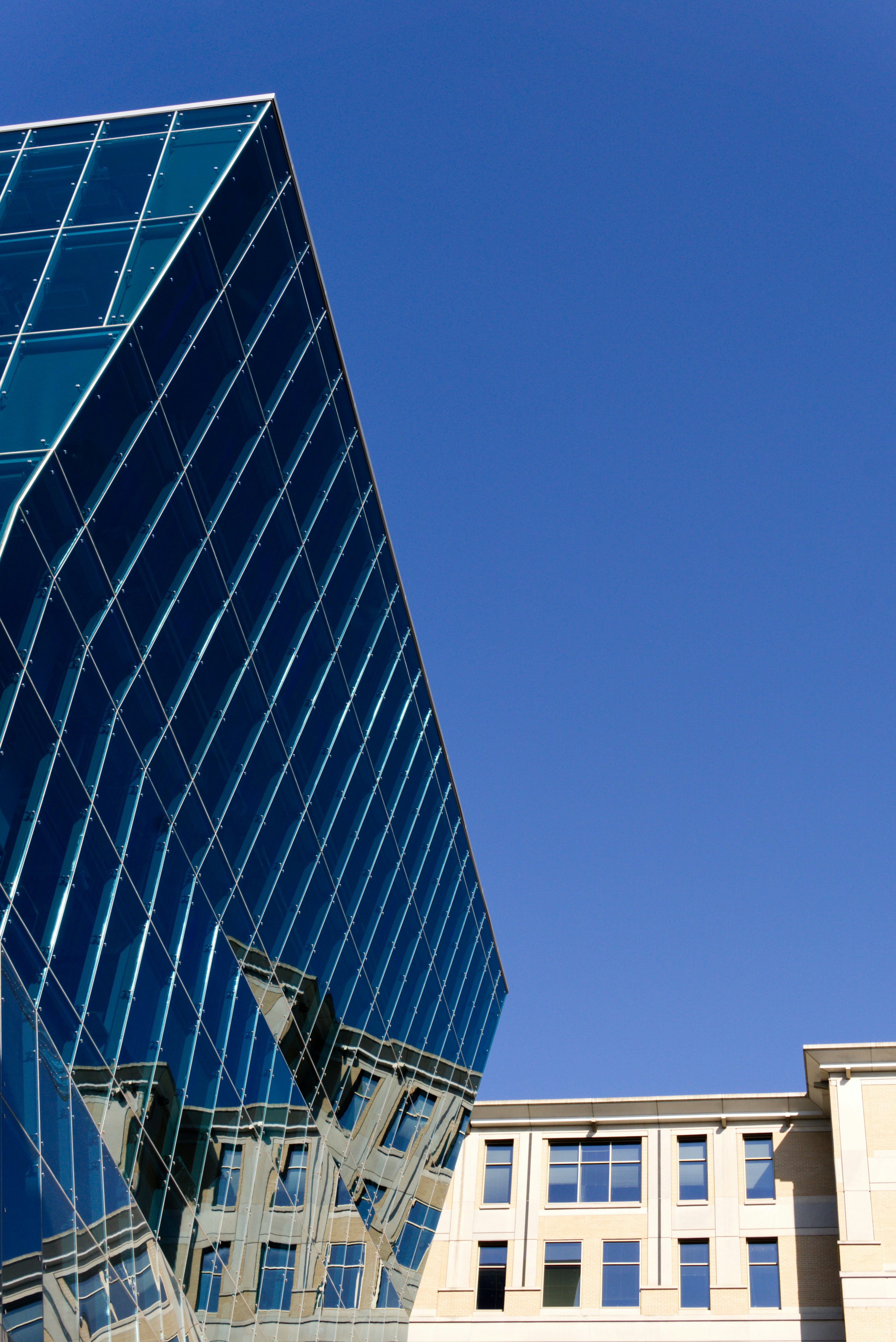 A tall glass building photo – Free Madison Image on Unsplash