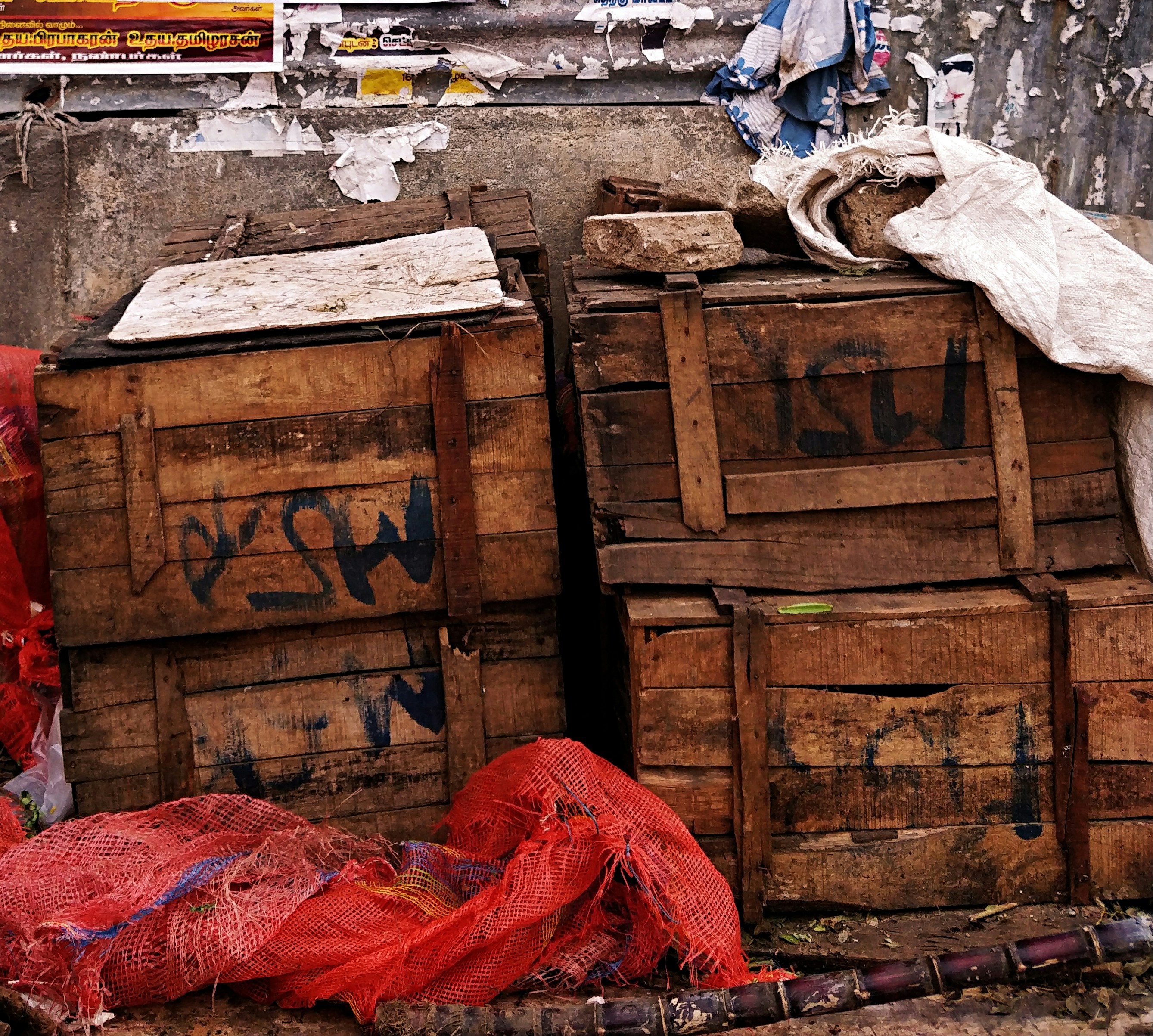 A group of wood boxes with graffiti on them photo – Free Saidapet Image ...
