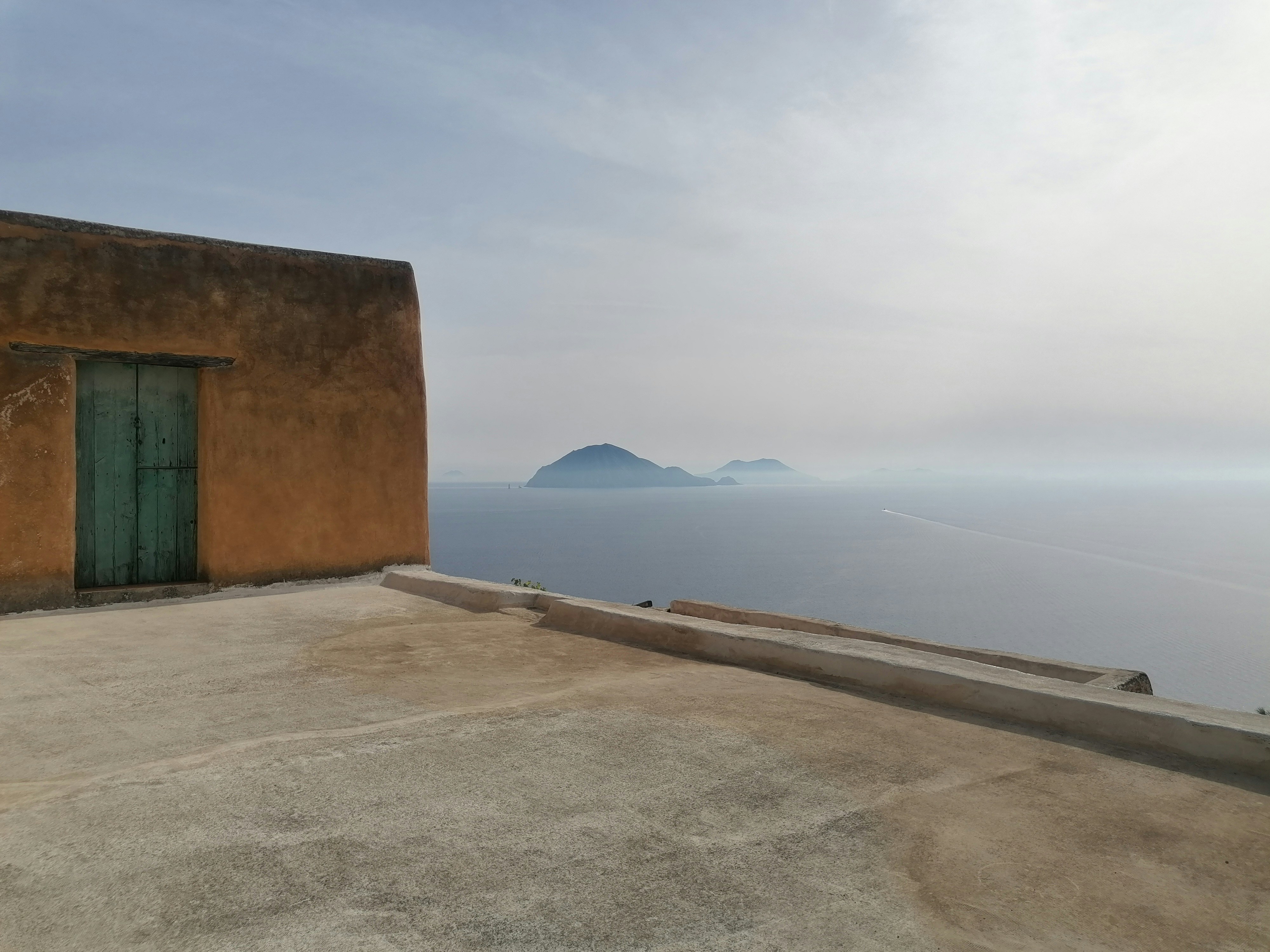 Terraced Rooftop Overlooking a Quiet Sea