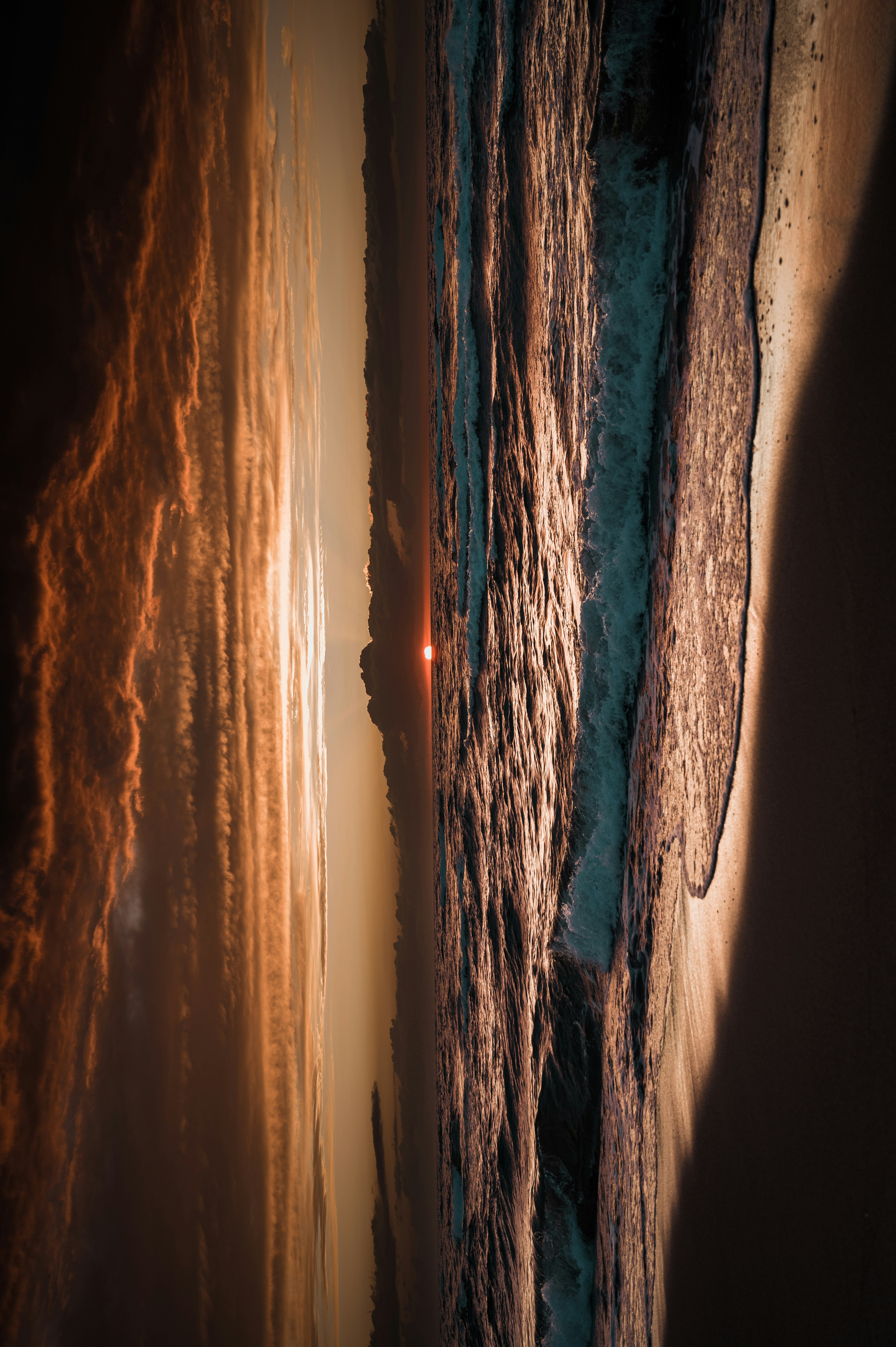 Sunlit Serrations: Sunset over a Textured Seascape