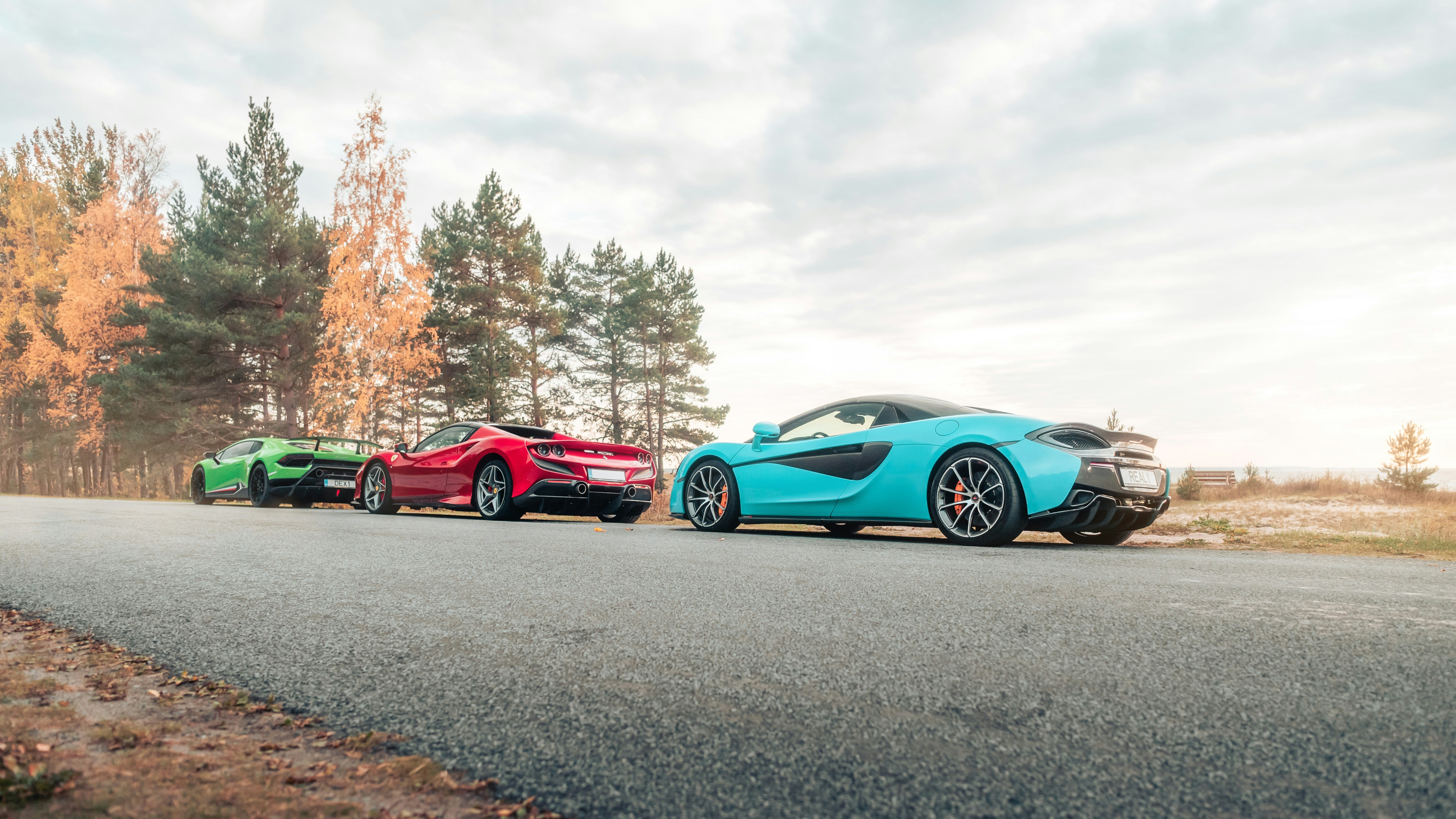 A group of cars parked on a road photo – Free Estonia Image on Unsplash