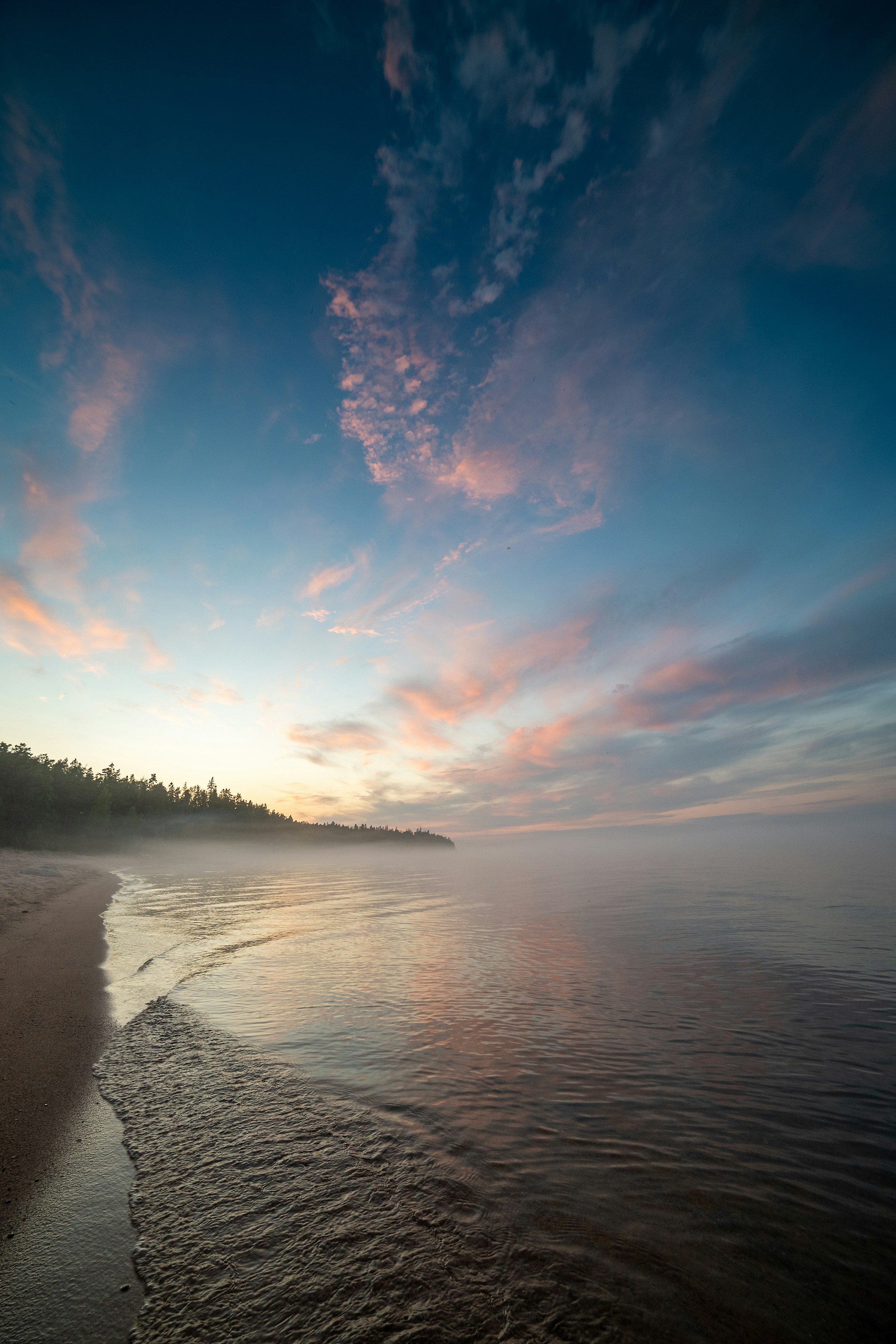 Whispers of Dawn: A Serene Shoreline Awakening