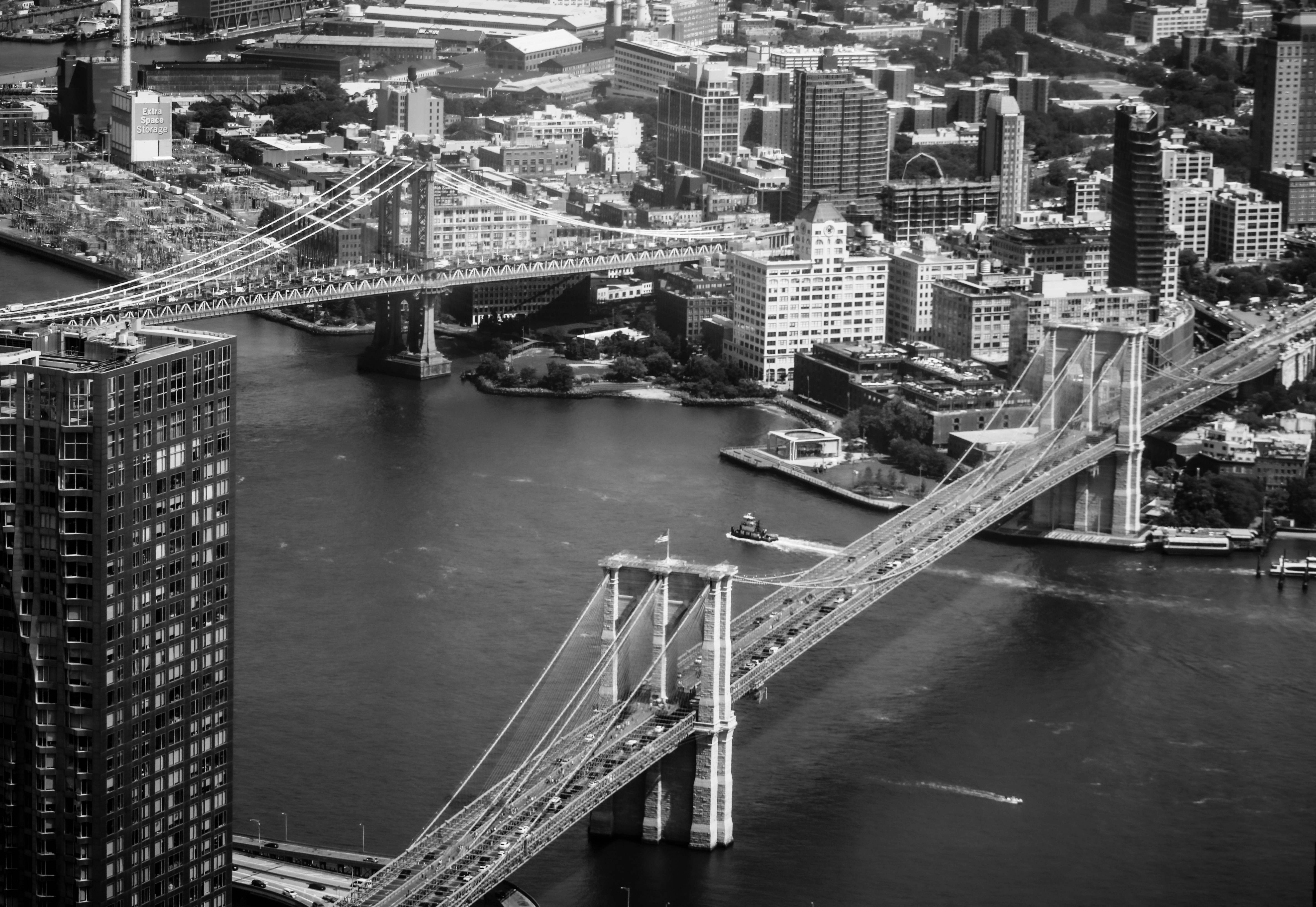 Steel Arches Over a Monochrome River: Cityscape Bridge Study