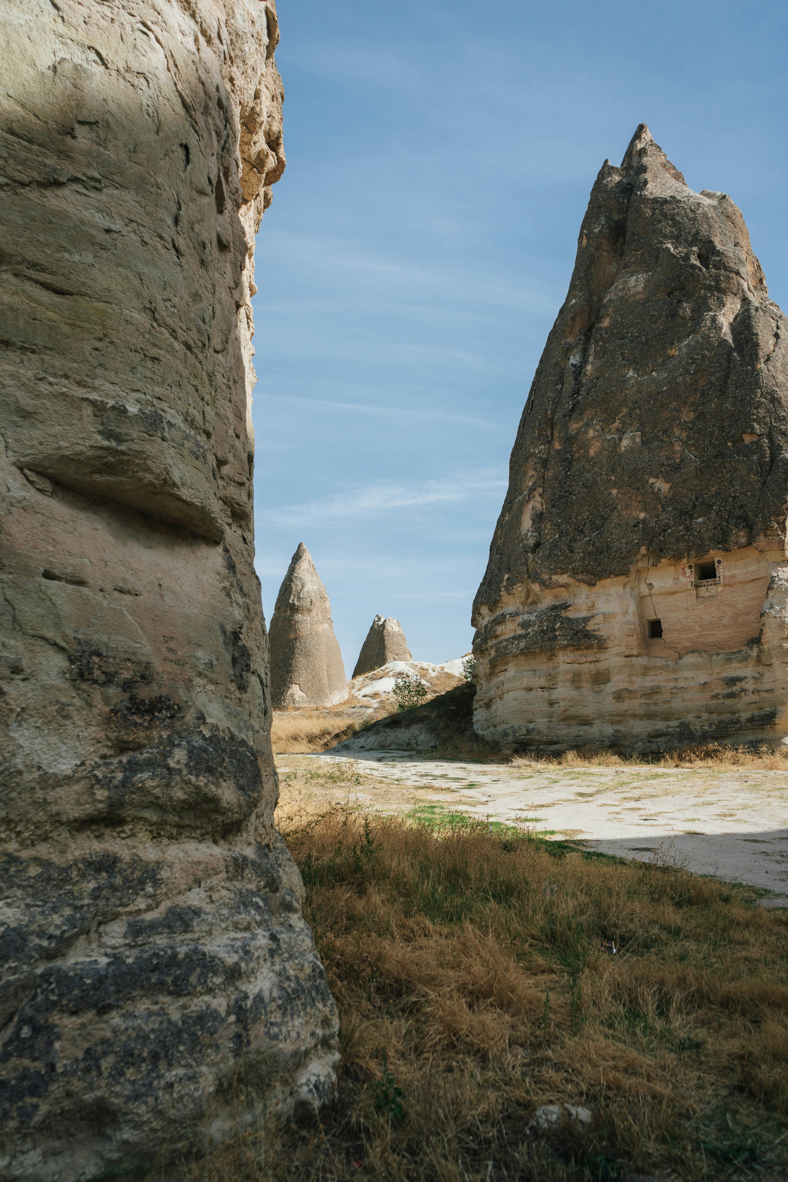 A group of tall rocks photo – Free Cappadocia Image on Unsplash