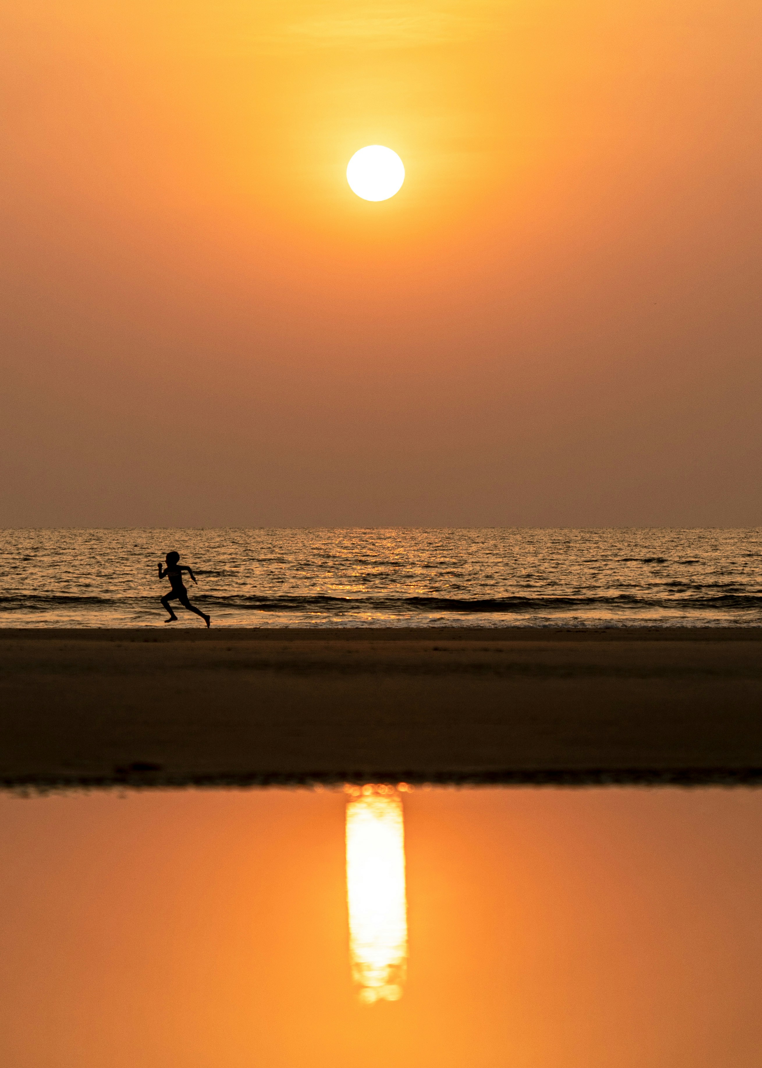A person surfing on the sea photo – Free Goa Image on Unsplash