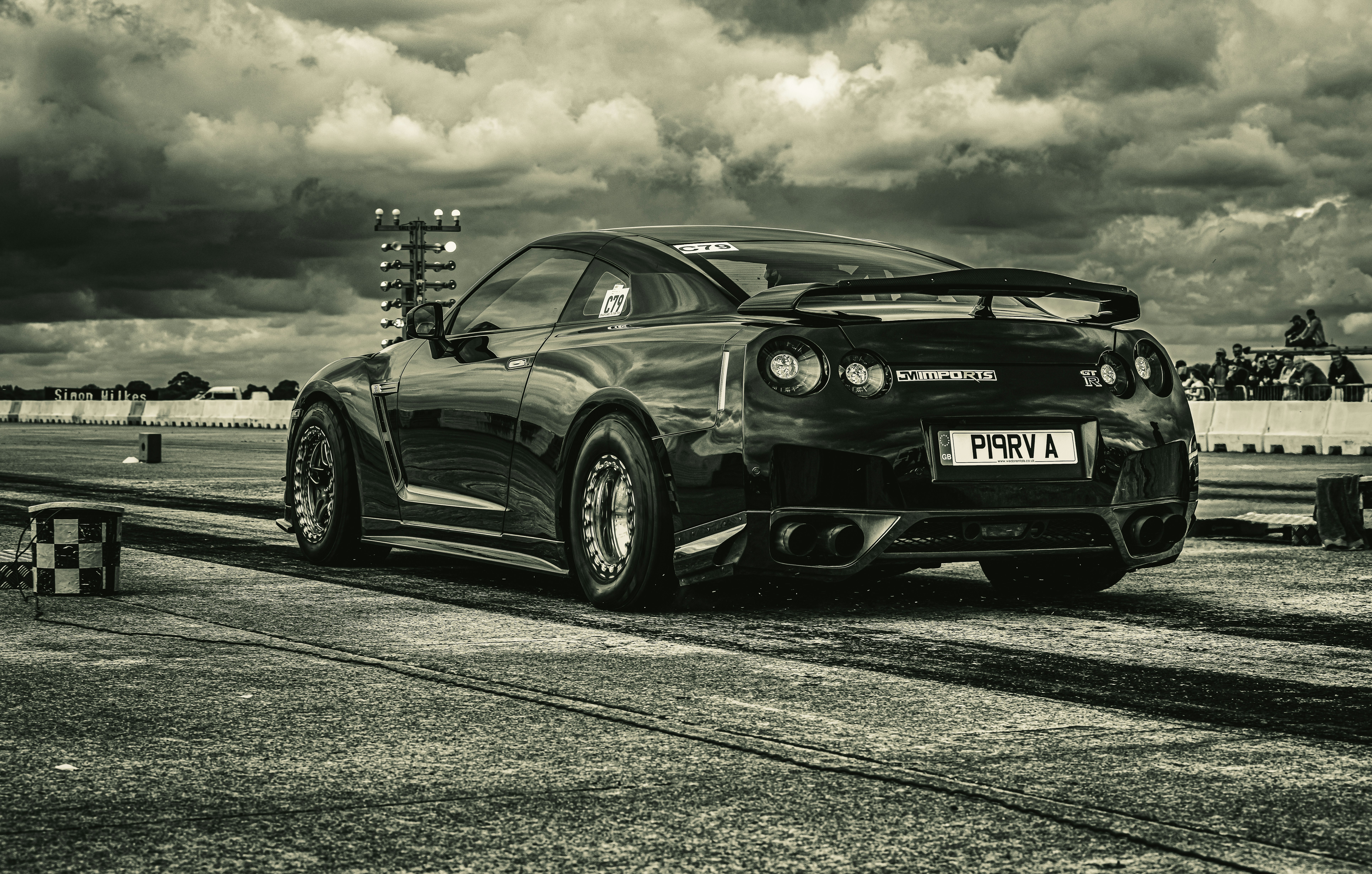 A black car on a track photo – Free Elvington airfield Image on Unsplash