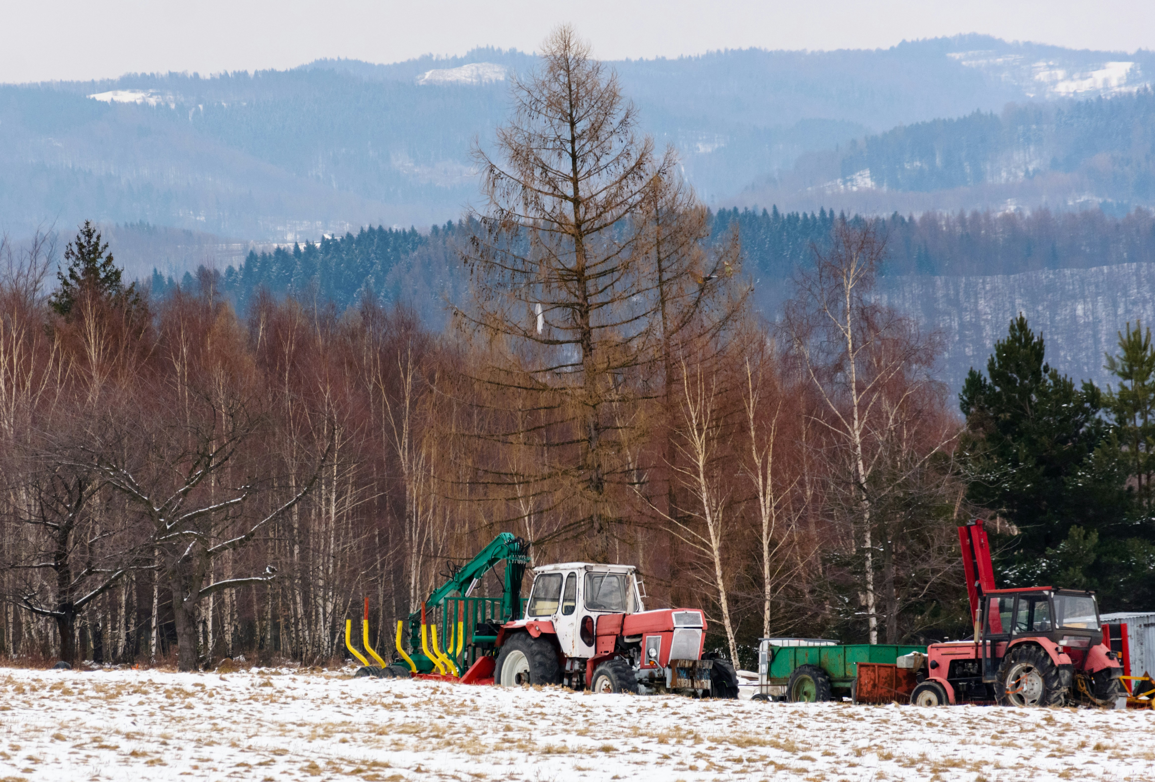 Agricultural machinery on the field in the mountains
