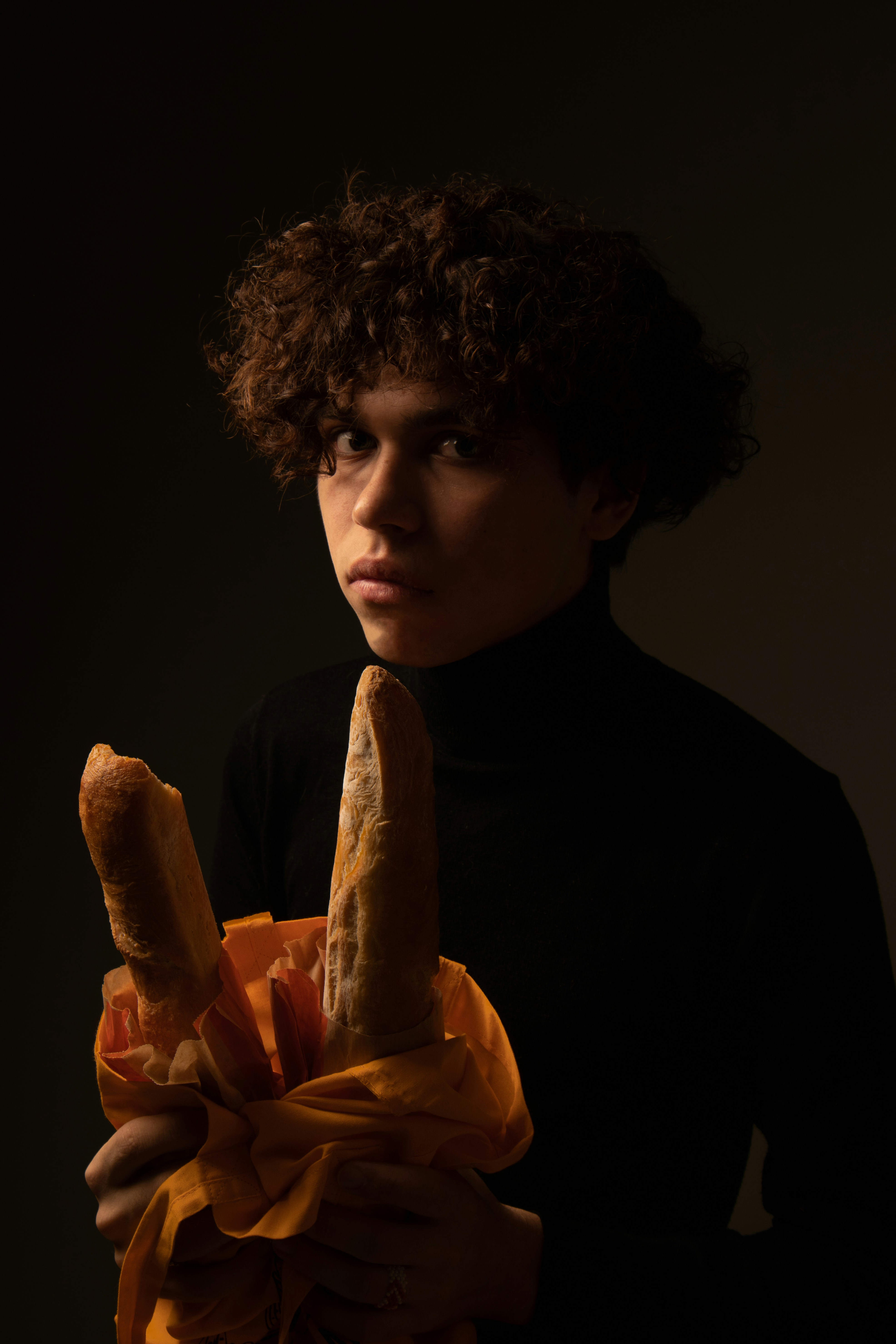 a man holding a potato