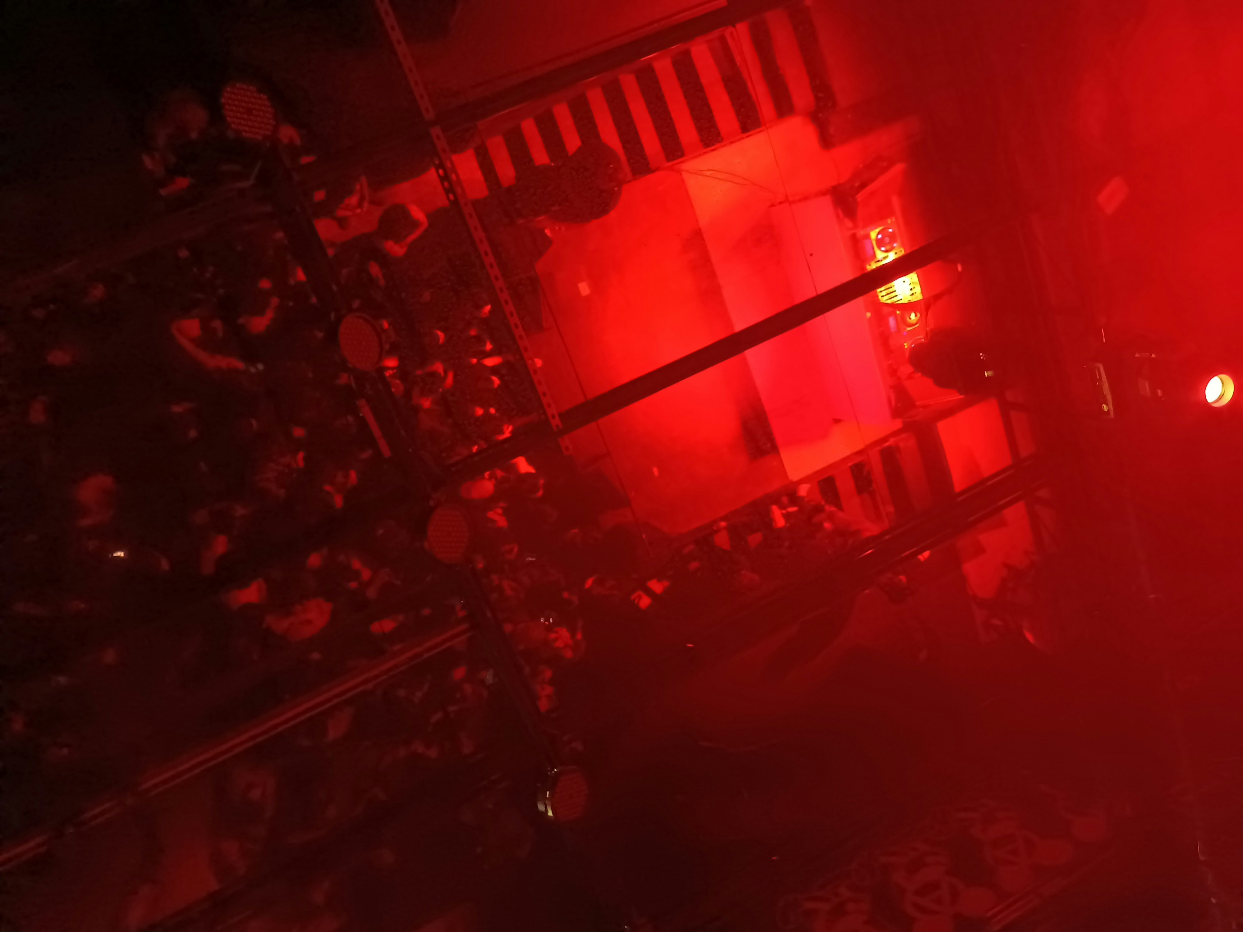 Crimson doorway in a red-hazed corridor