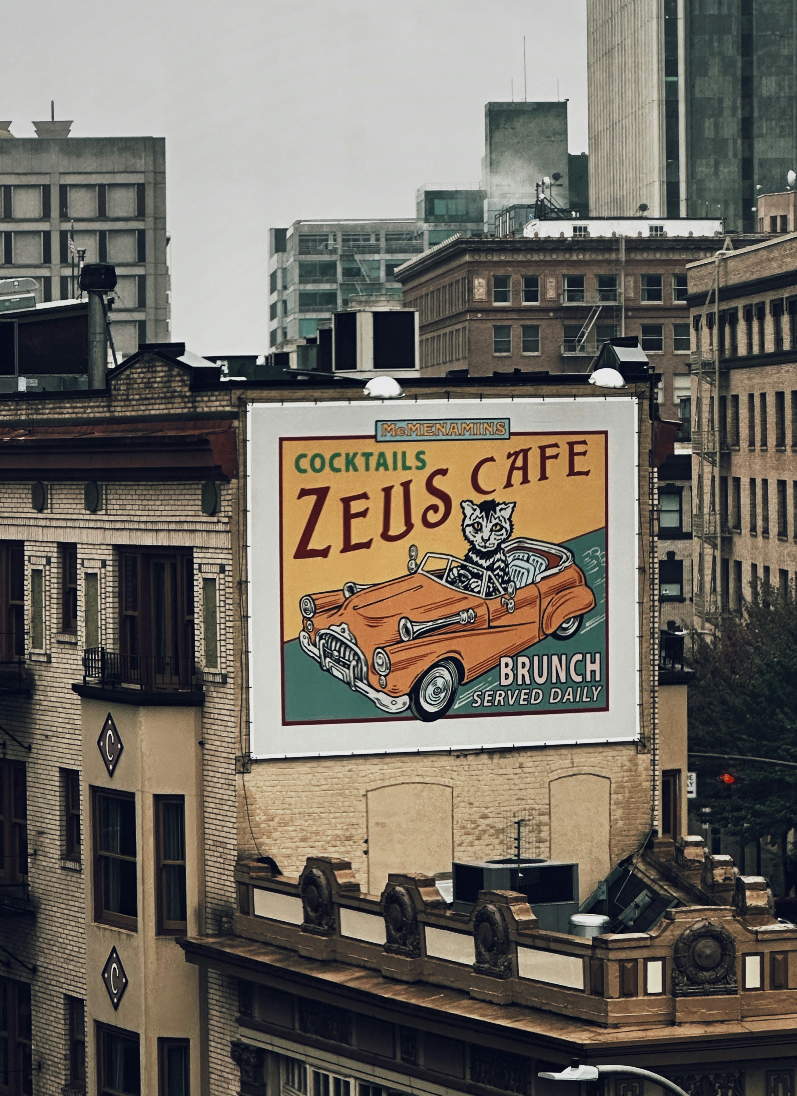 Zeus Café Neon Sign Overlooking a City Rooftop