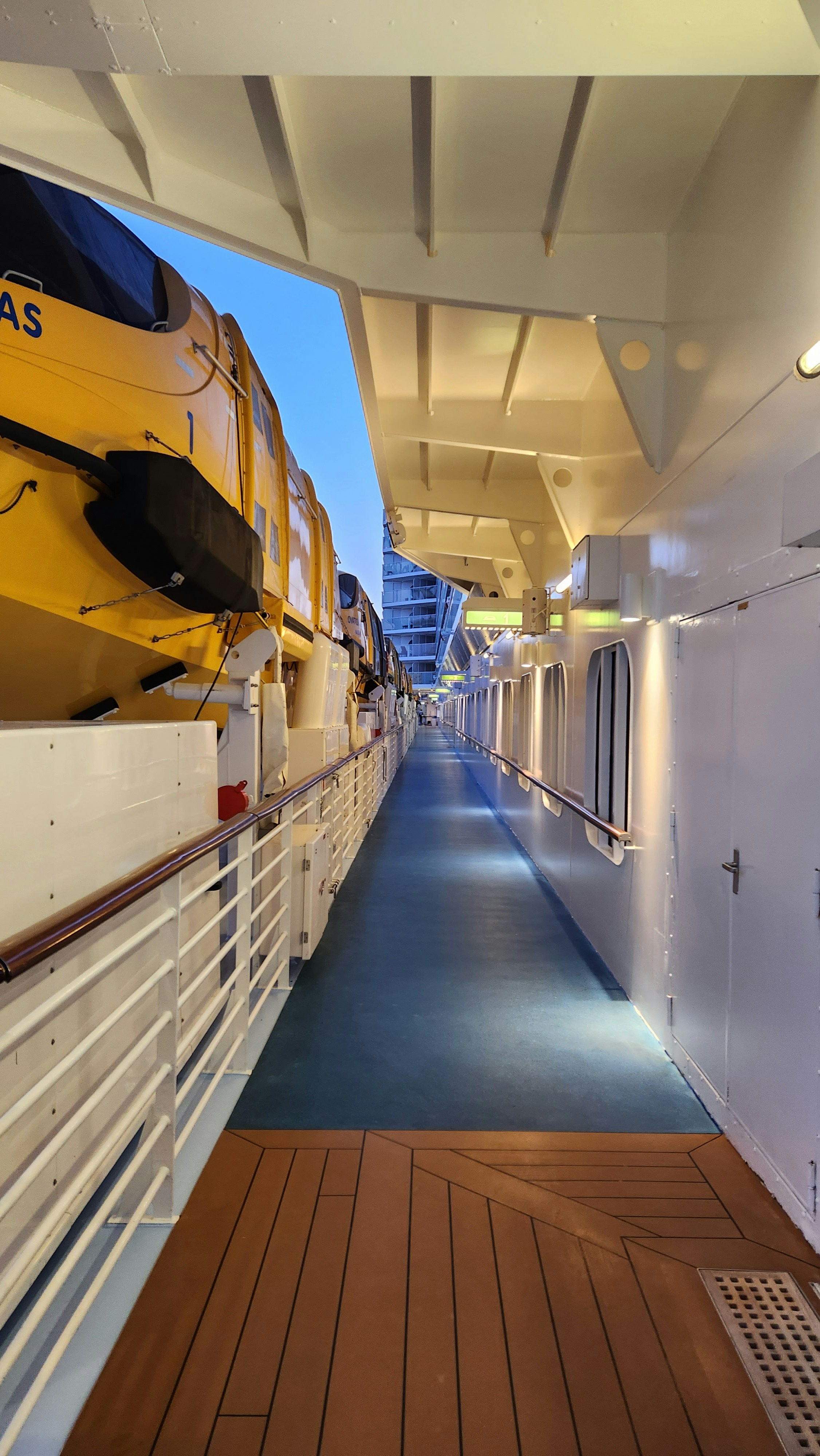 a hallway with a blue and yellow train