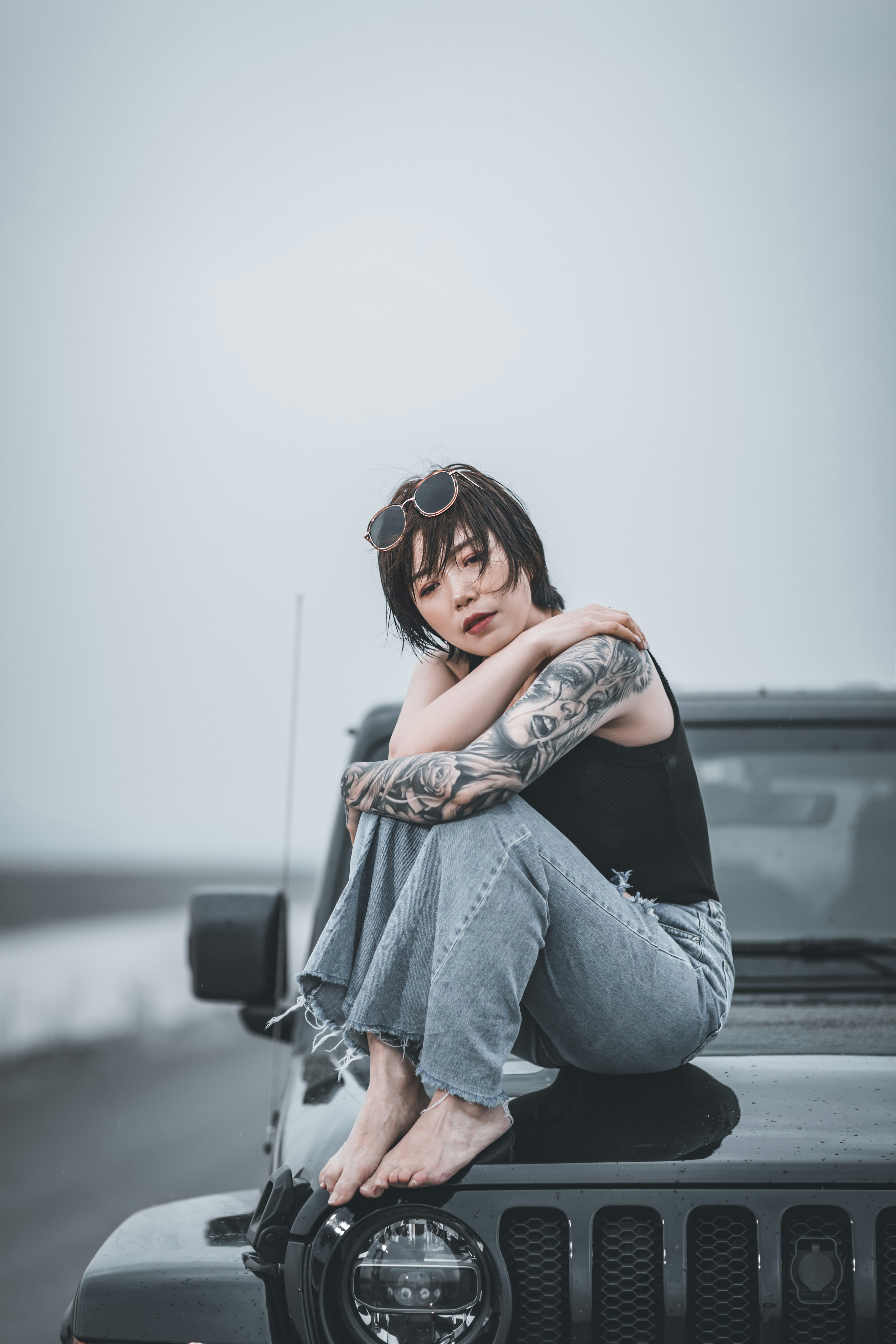 Passenger of a Quiet Road: Tattoos and Solace on the Hood