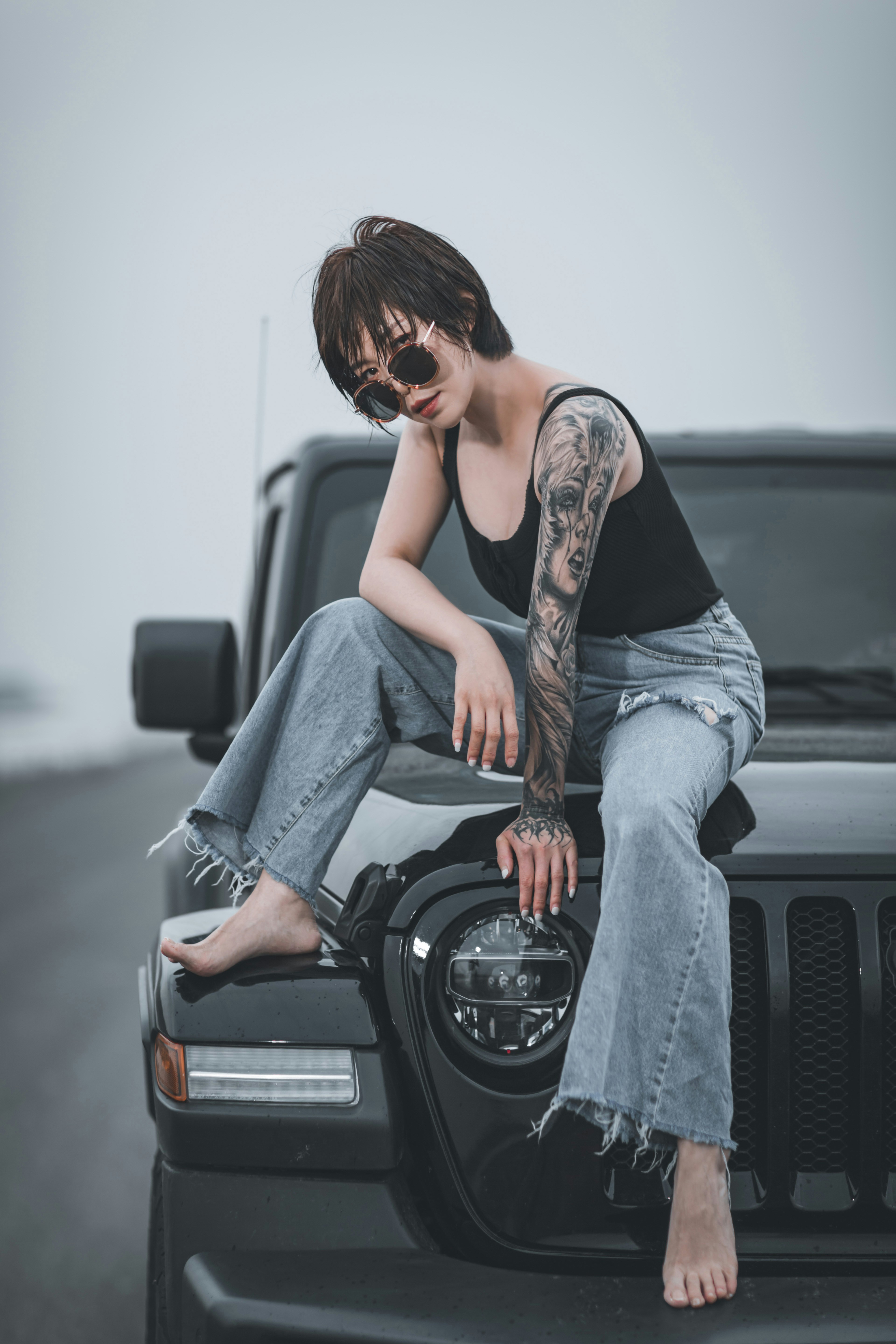 a person sitting on a car
