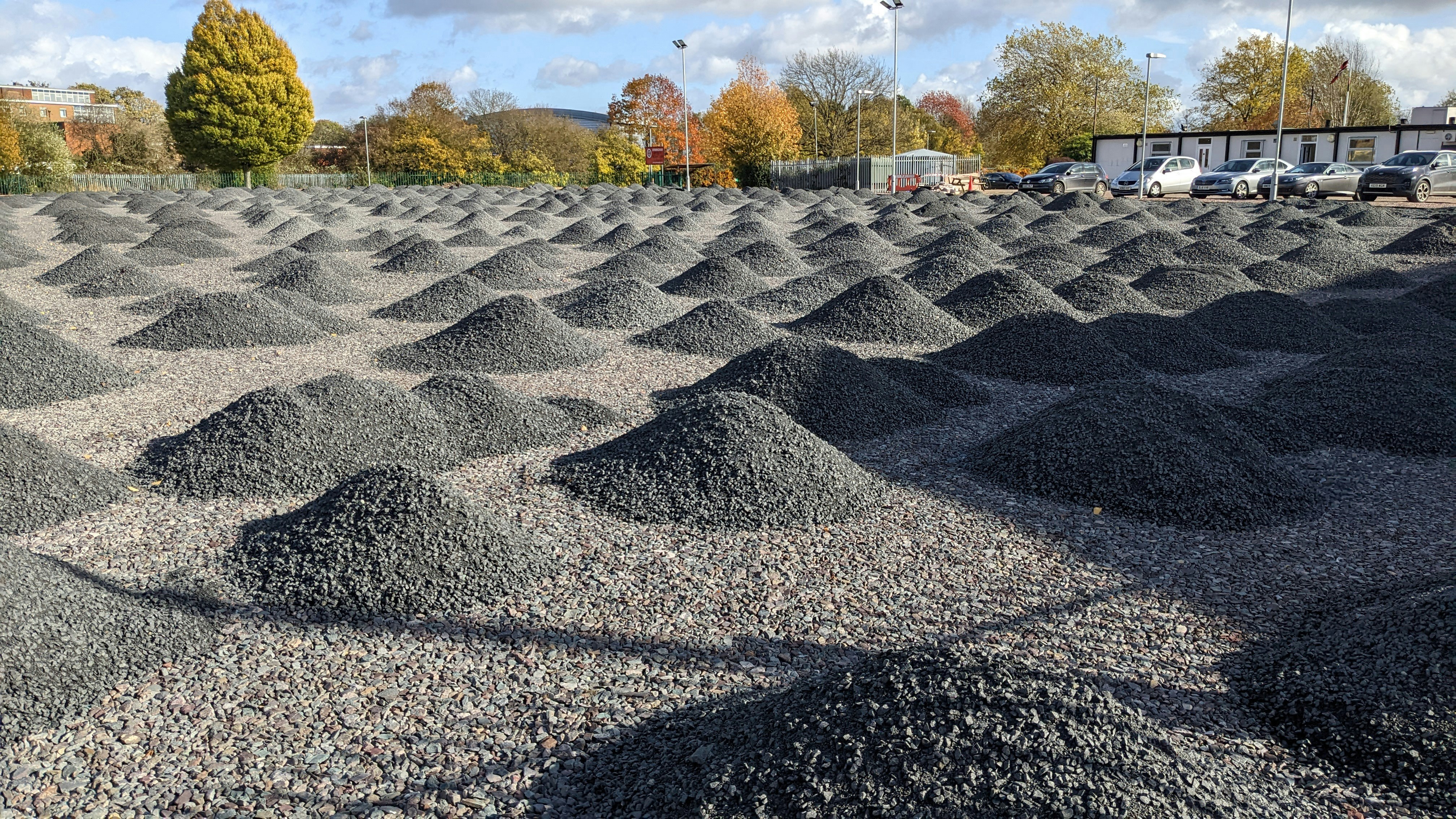 grey gravel hillocks in urban landscape