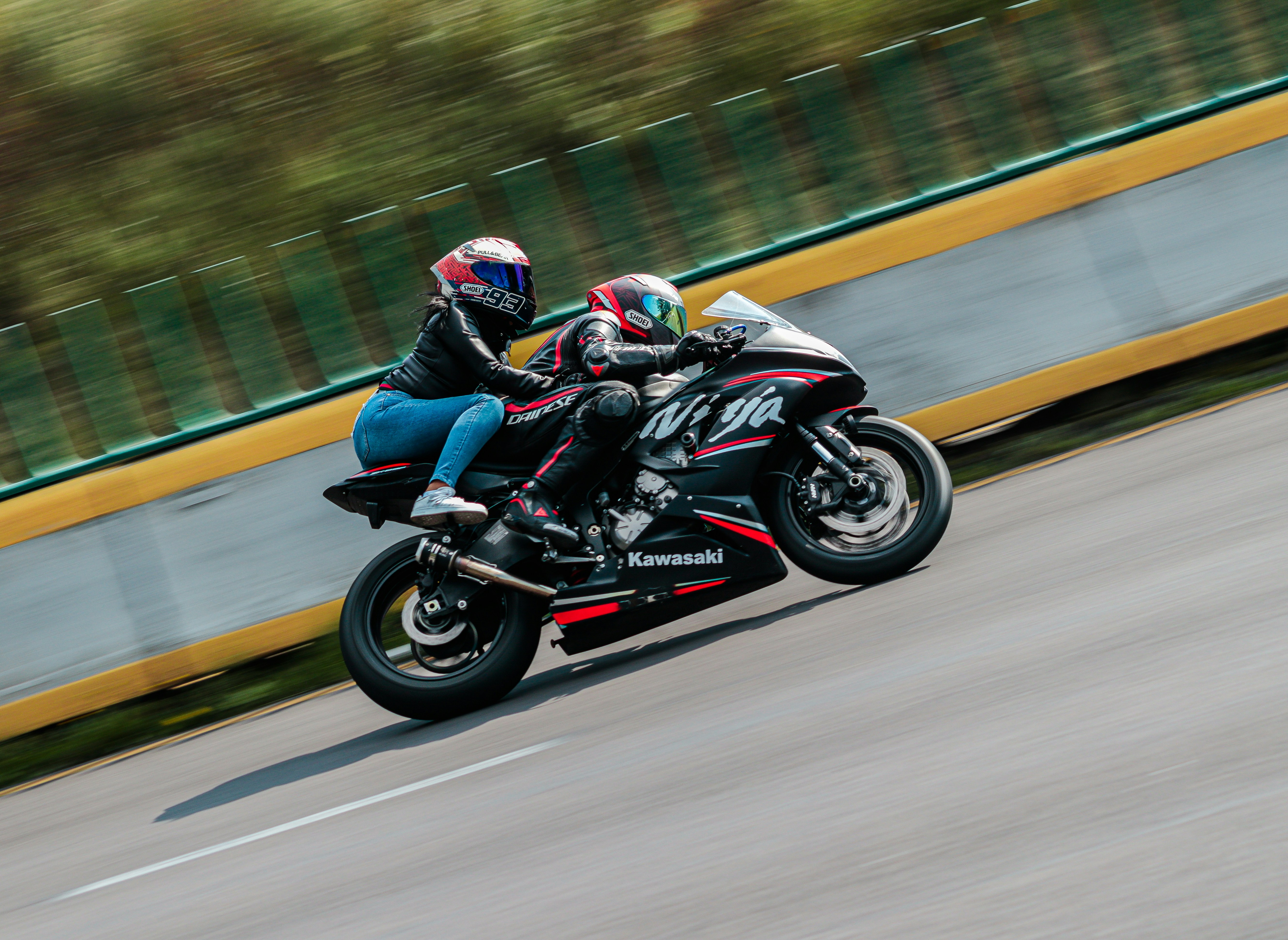 A couple of people riding a motorcycle photo – Free Apparel Image on ...