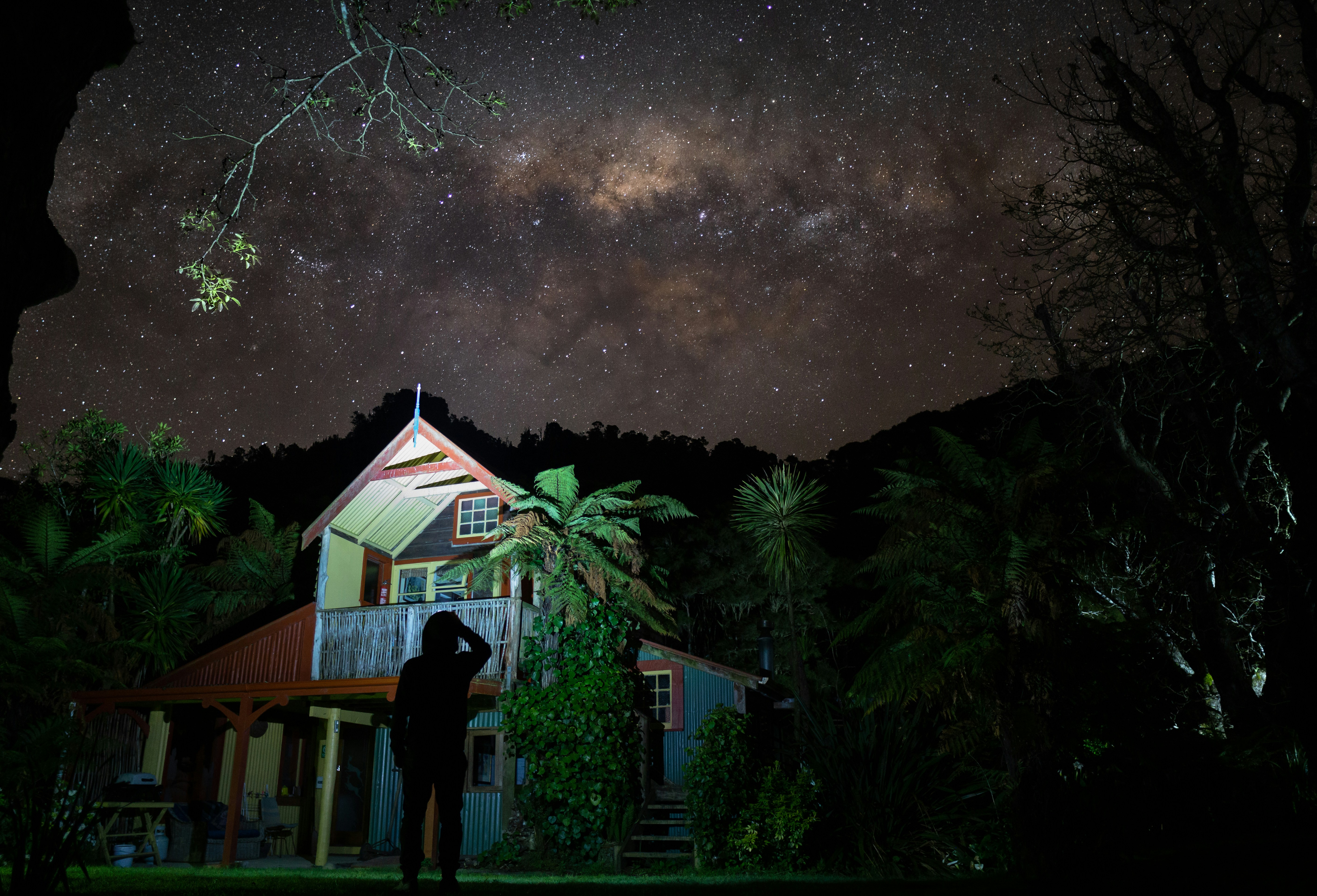 Milky Way Over a Quiet House: Nightscape Amid Tropical Pines