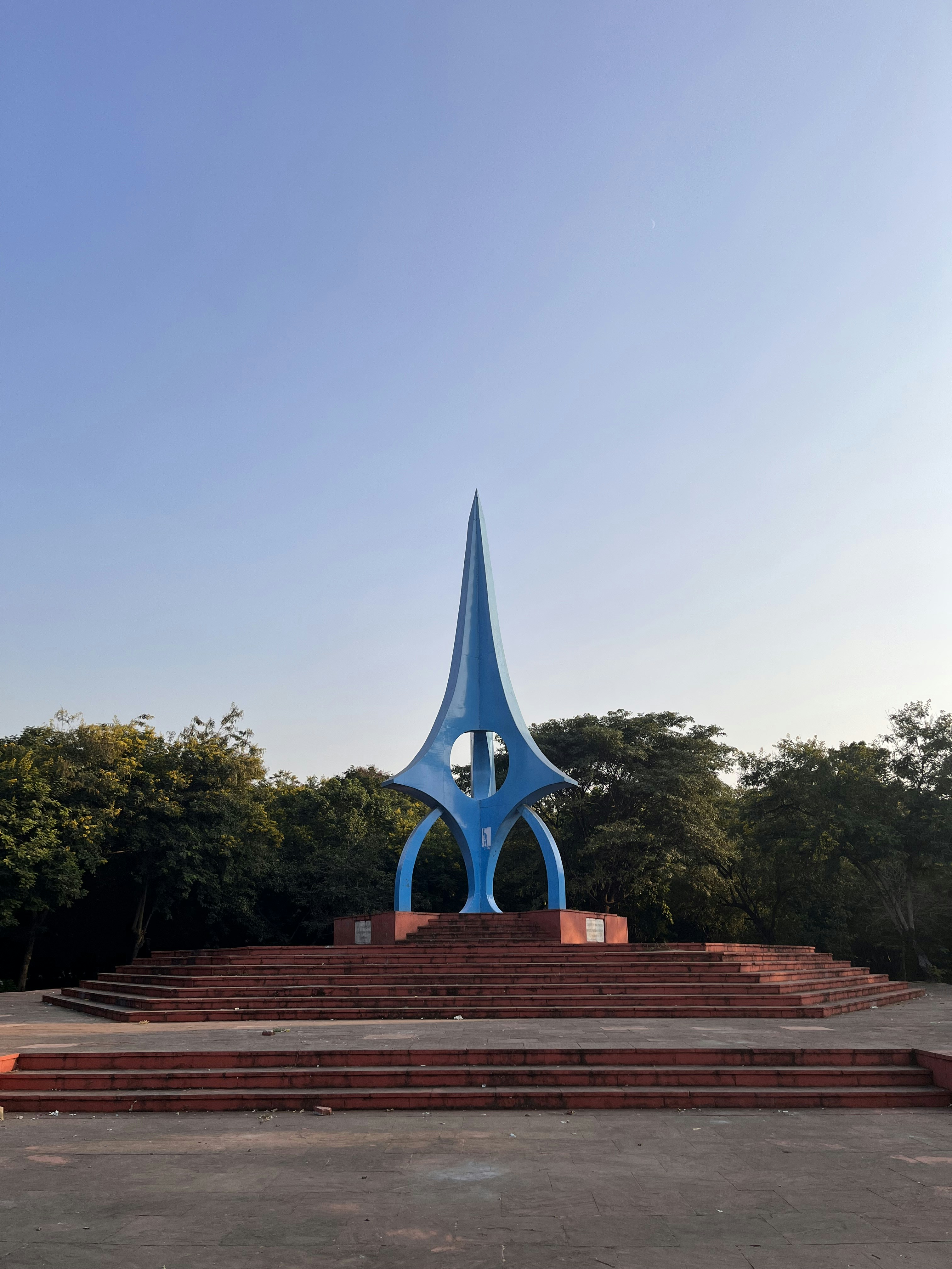Blue Monument Rising Above Red Steps