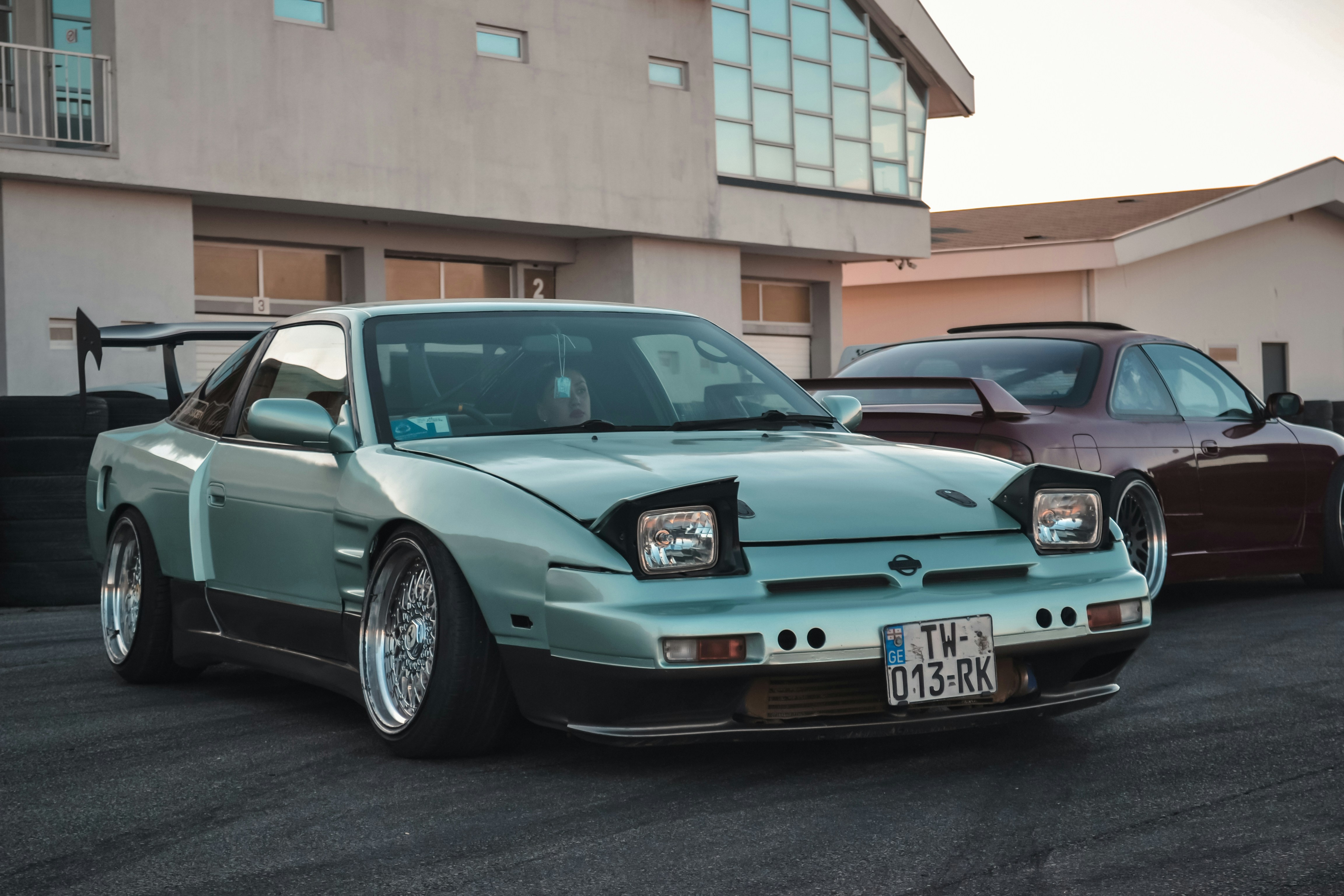 A car parked in front of a building photo – Free Rustavi racing track ...
