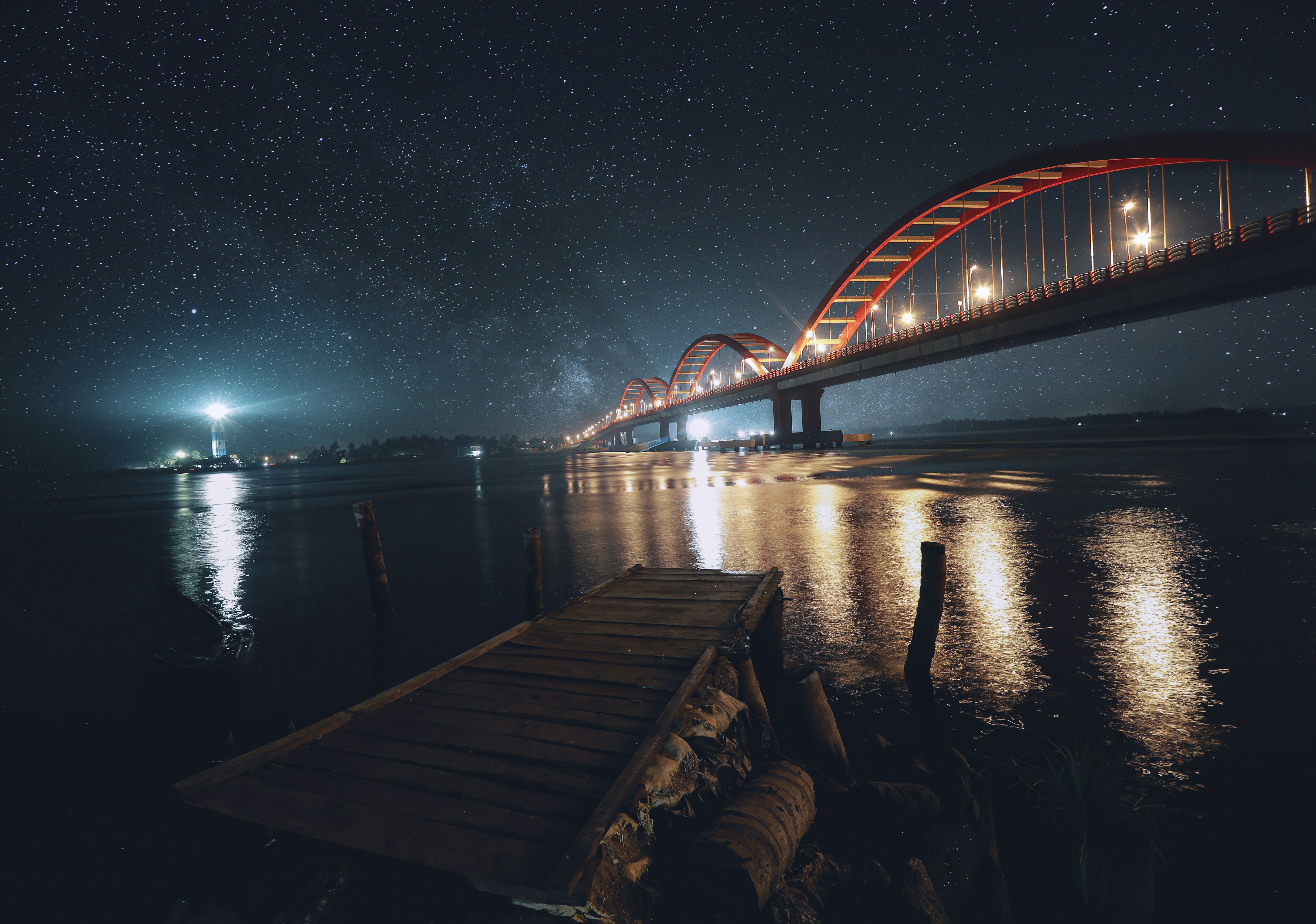 A bridge with lights at night photo – Free Earth Image on Unsplash