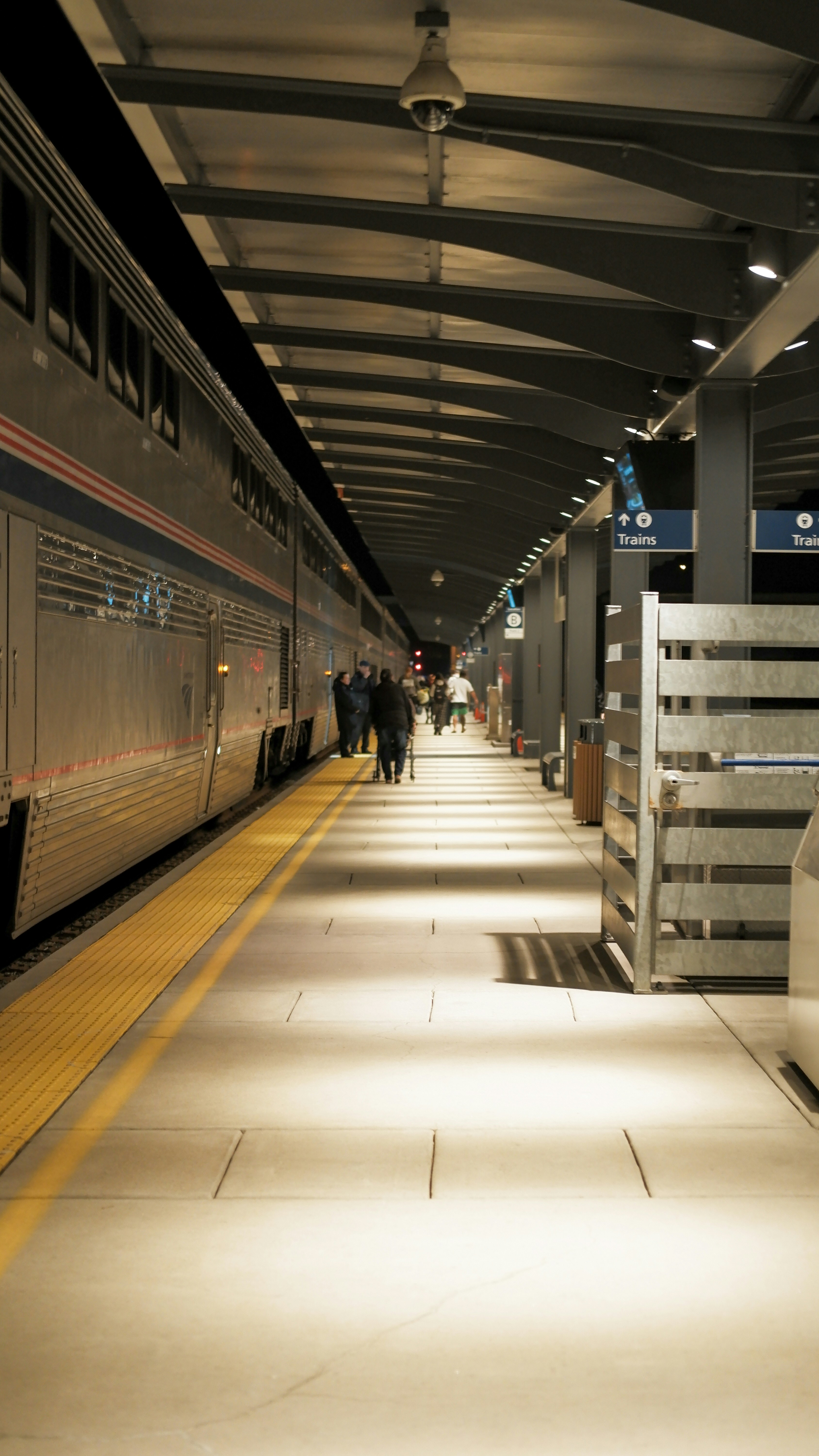 A train station with people walking photo – Free Human Image on Unsplash