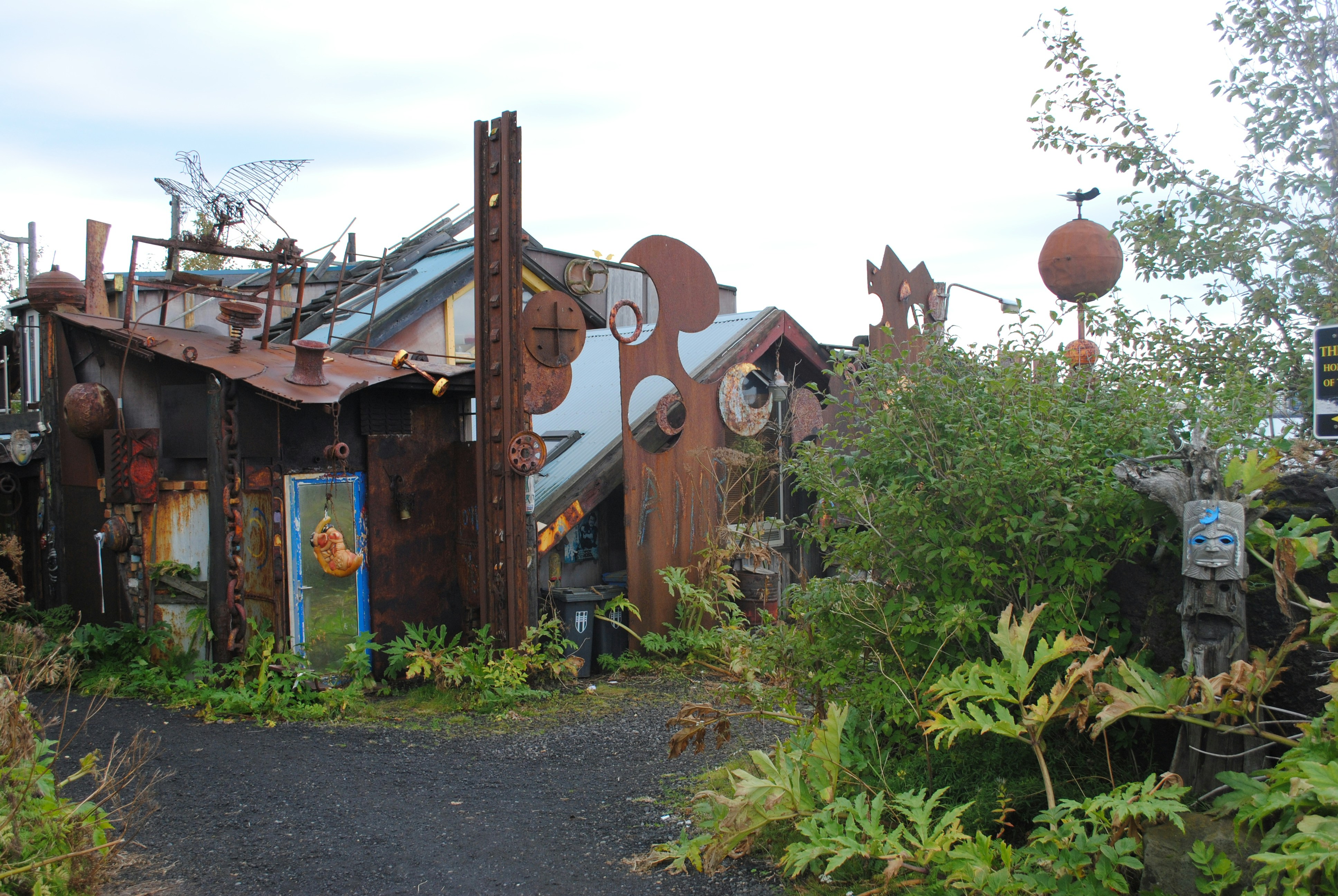 Rust and Ruins: A Weathered Playground Emerges from Greenery