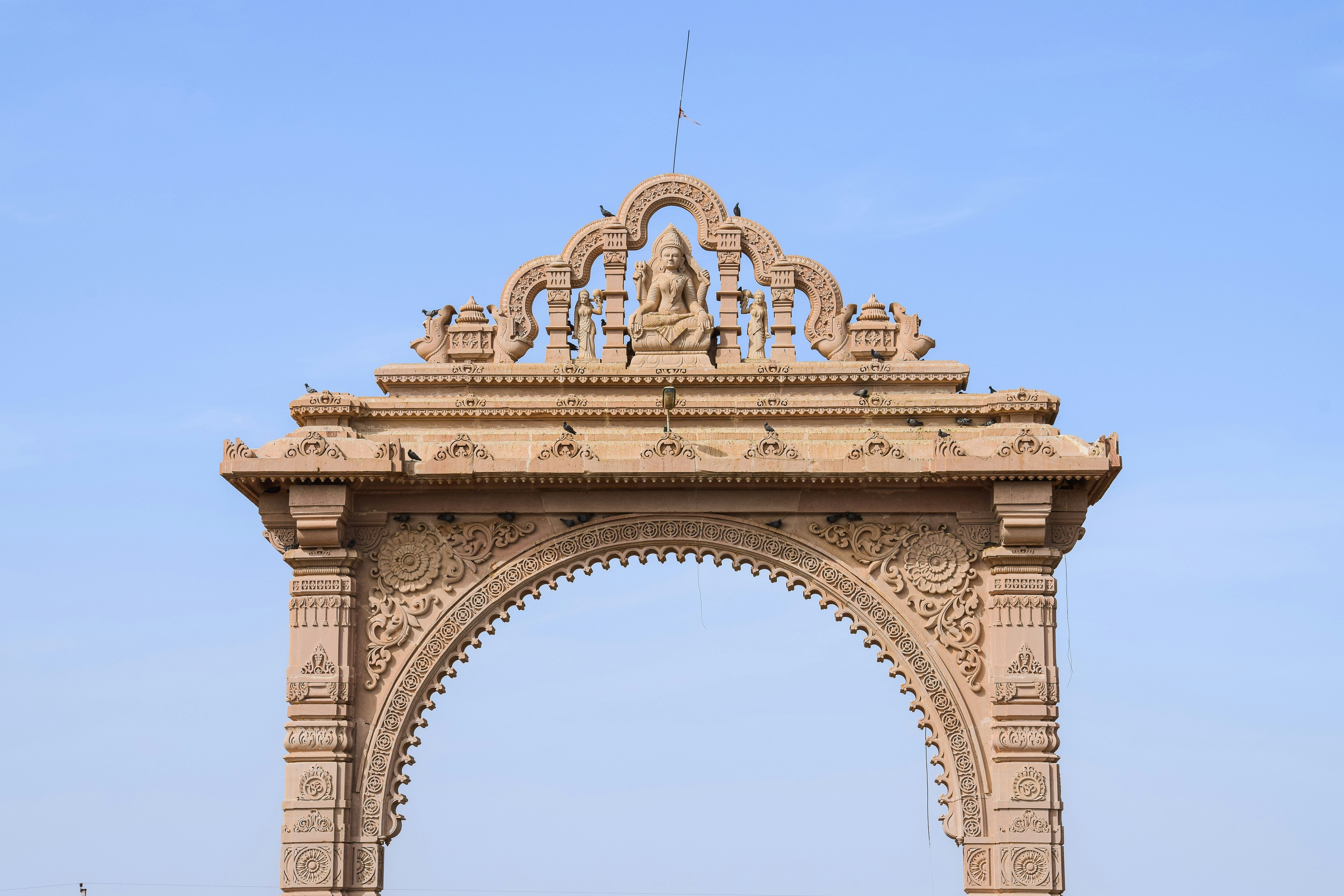 A large stone arch photo – Free India Image on Unsplash