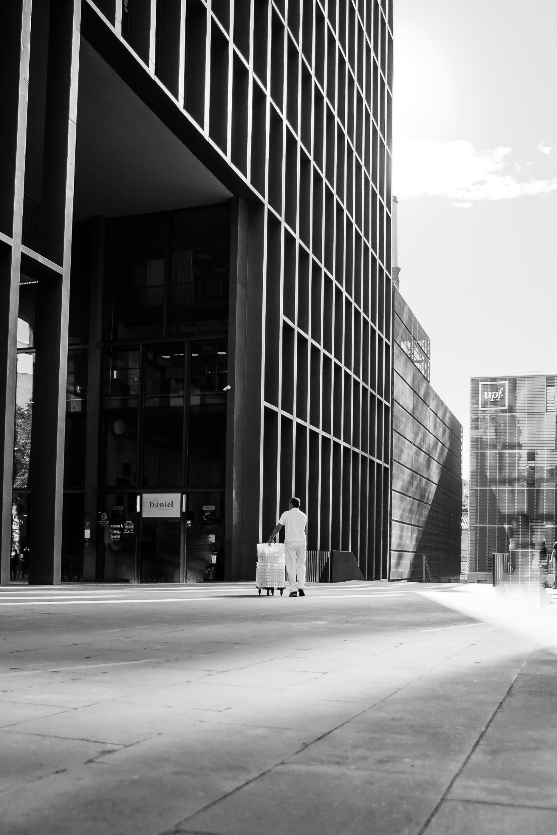 A person standing outside a building photo – Free Spain Image on Unsplash