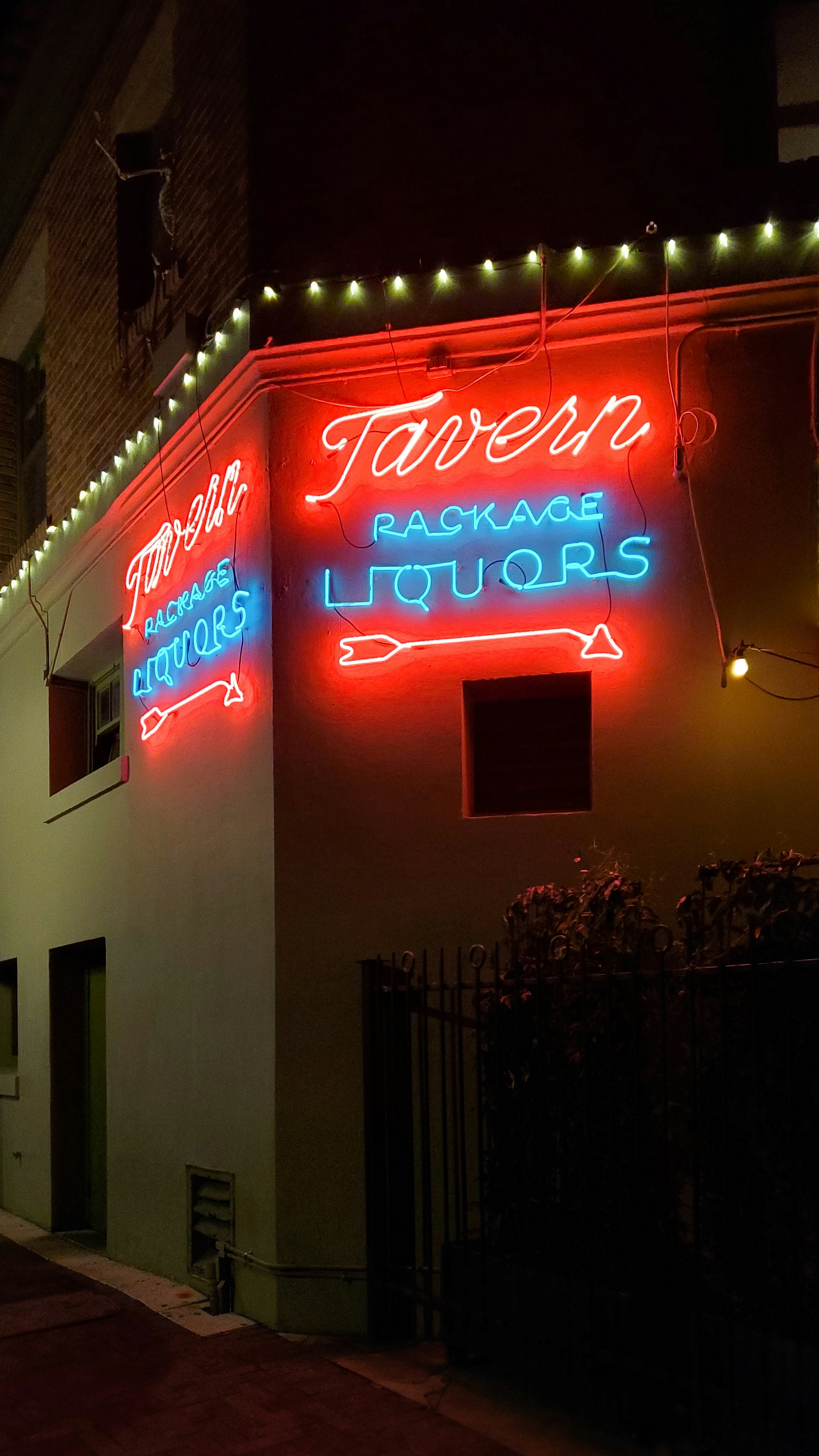 A building with neon signs photo – Free Neon Image on Unsplash