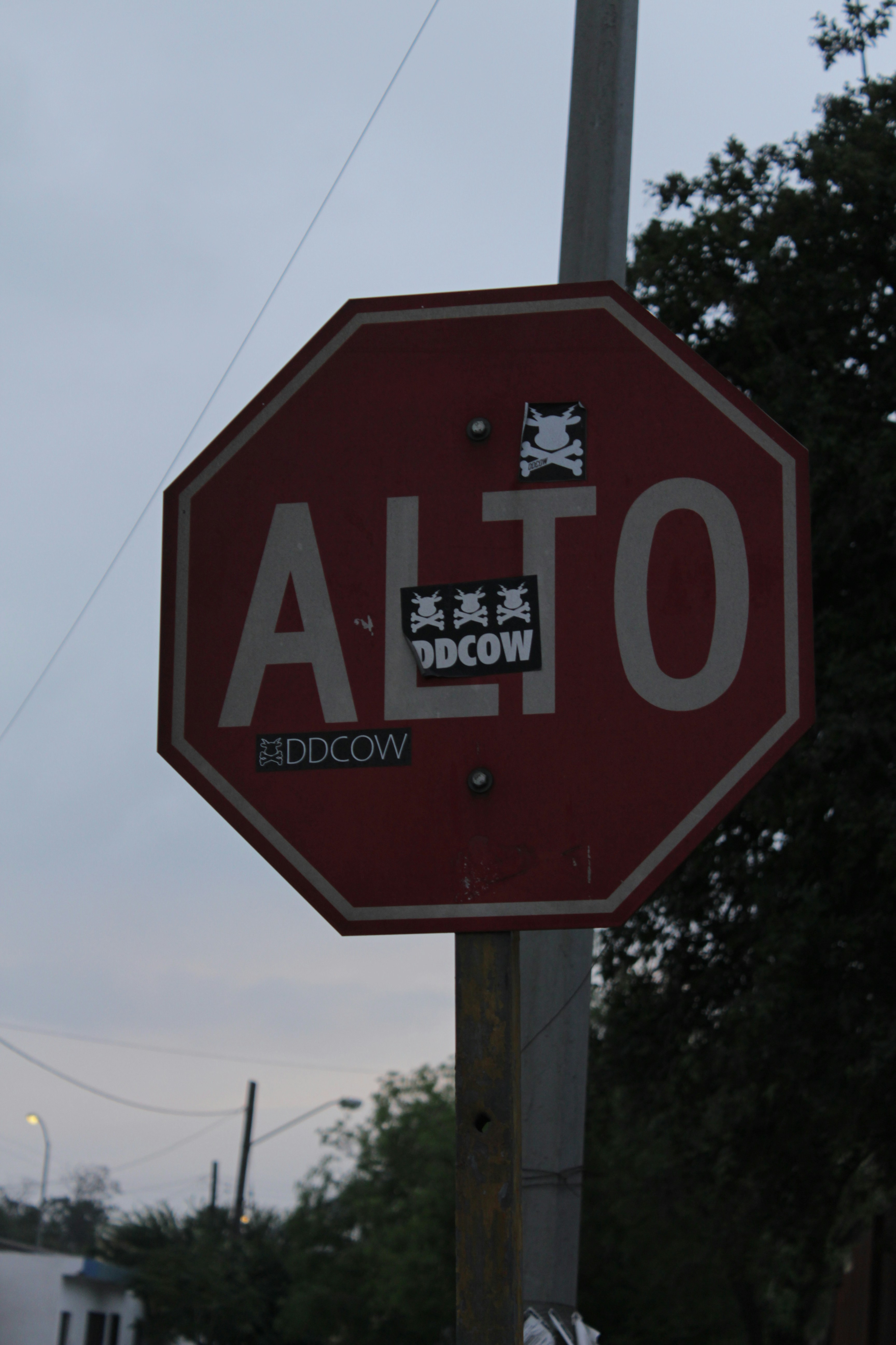 A stop sign with stickers on it photo – Free Road signs Image on Unsplash