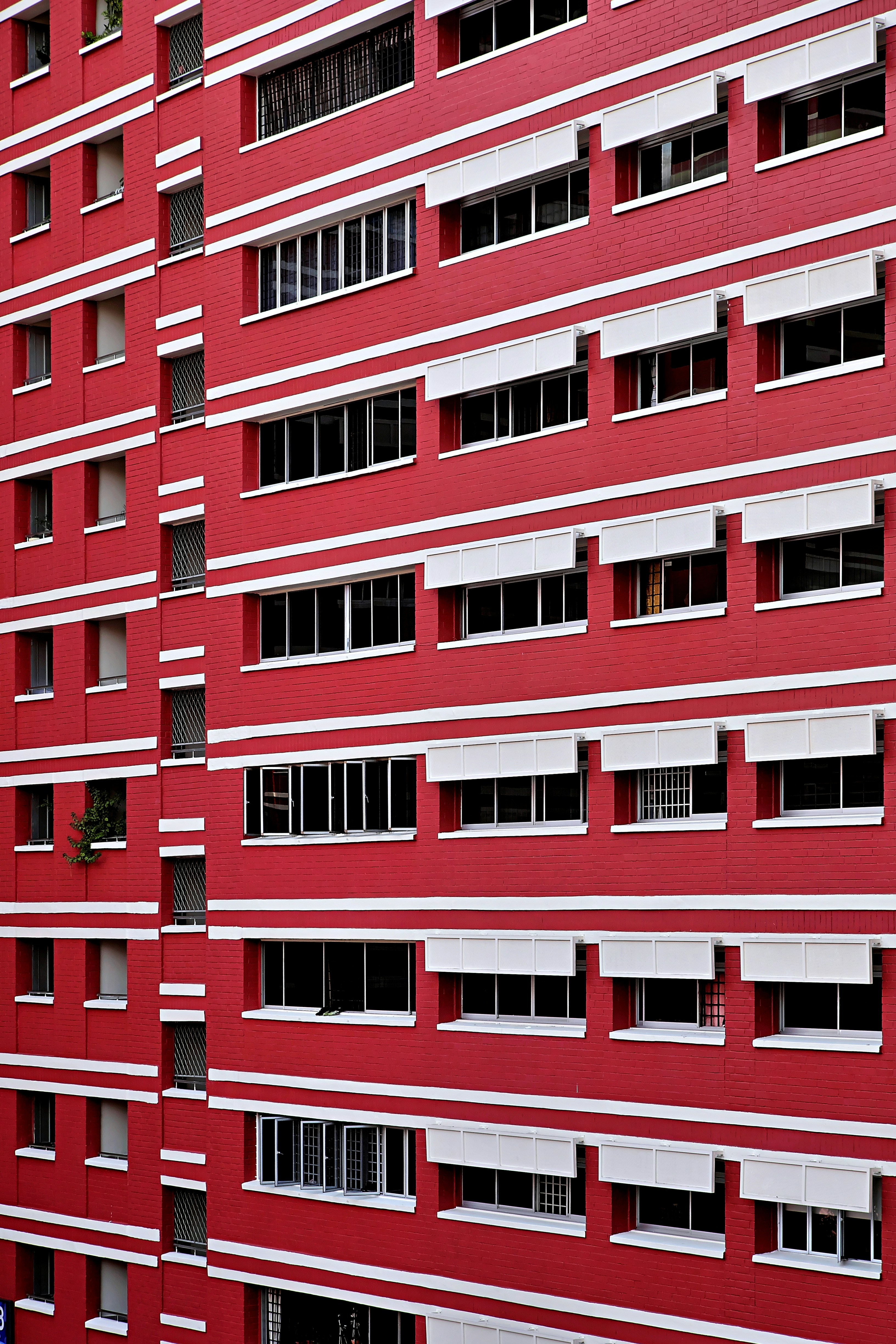 Un edificio rojo alto foto – Imagen de Arquitectura gratuita en Unsplash